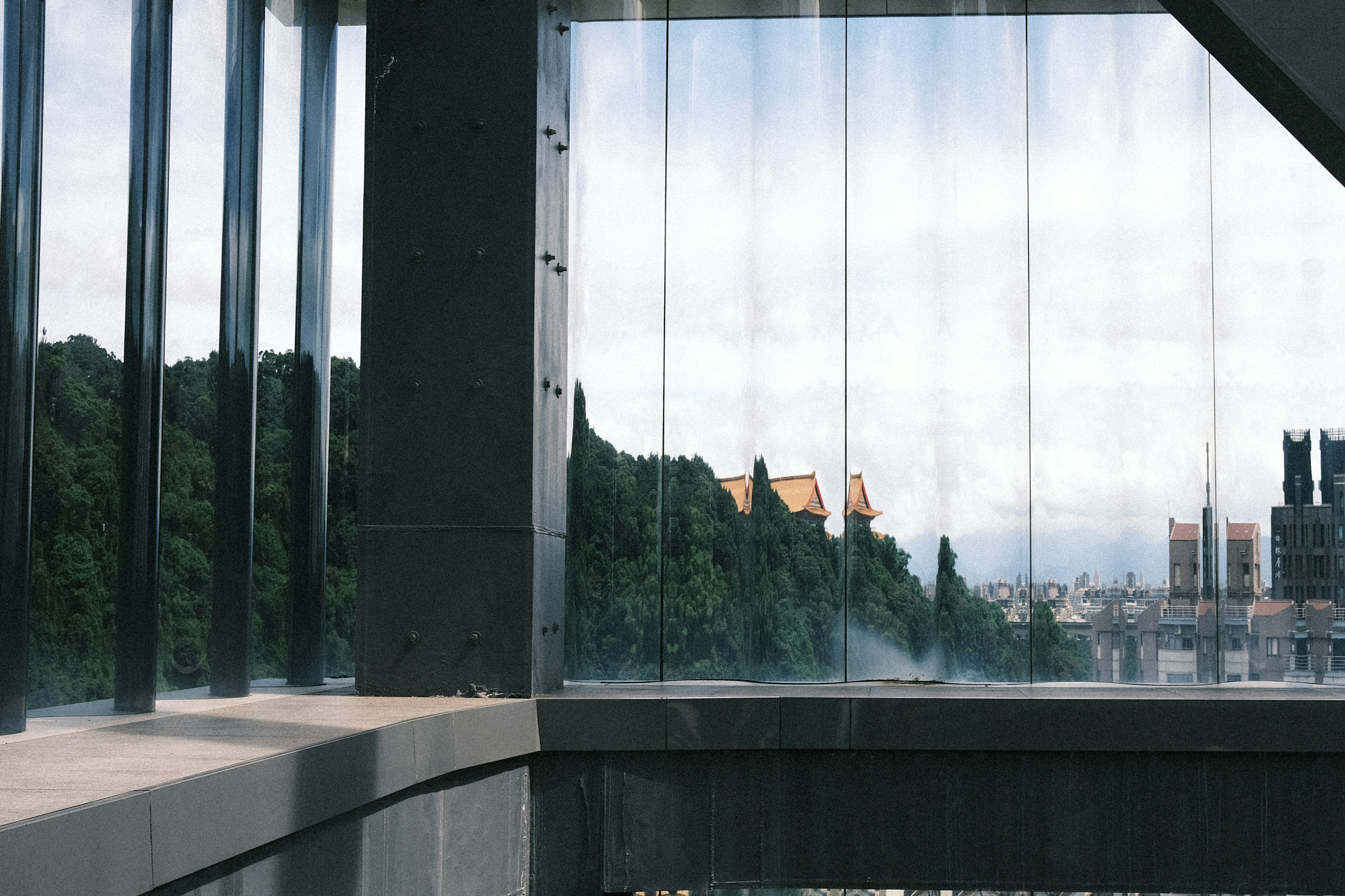 A view of a city through a glass window photo – Free Taiwan Image on ...