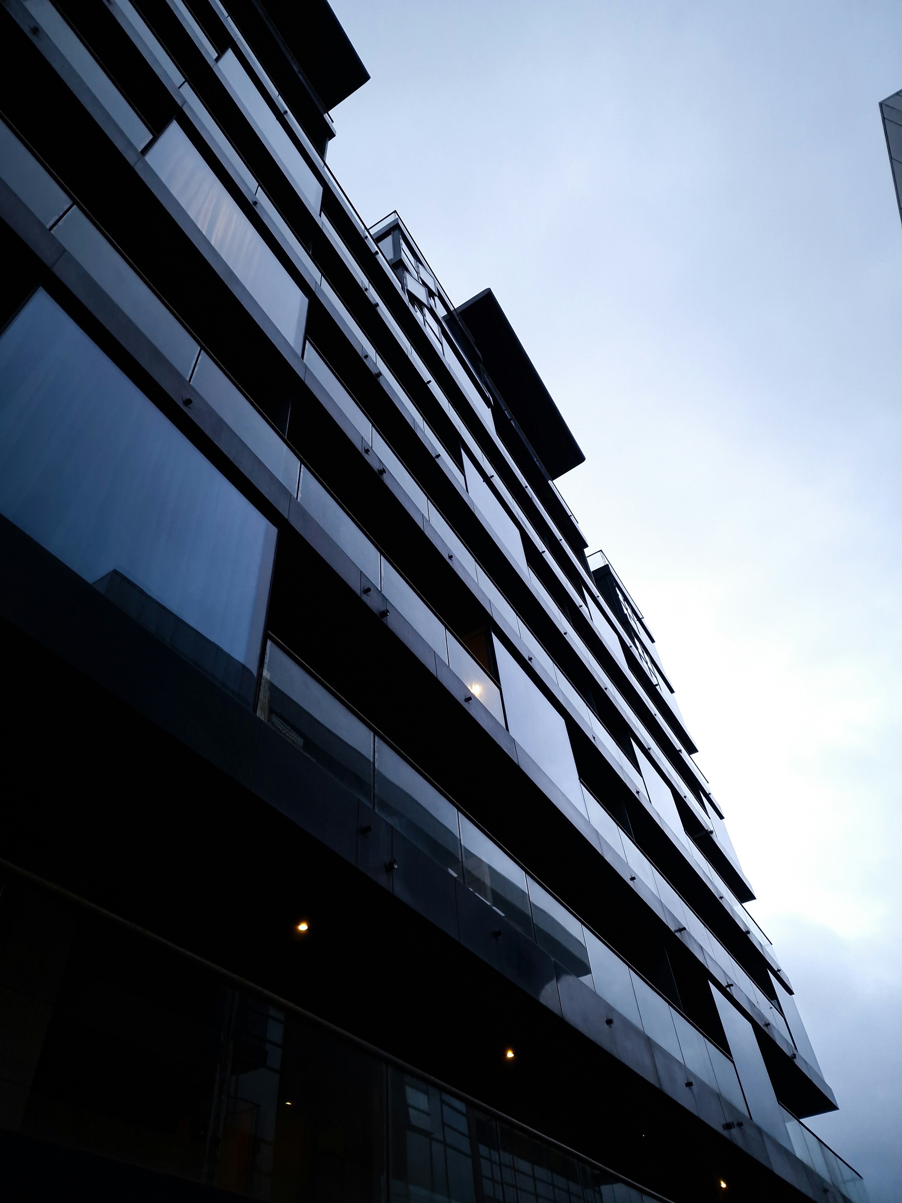 A very tall building with lots of windows photo – Free Architecture ...