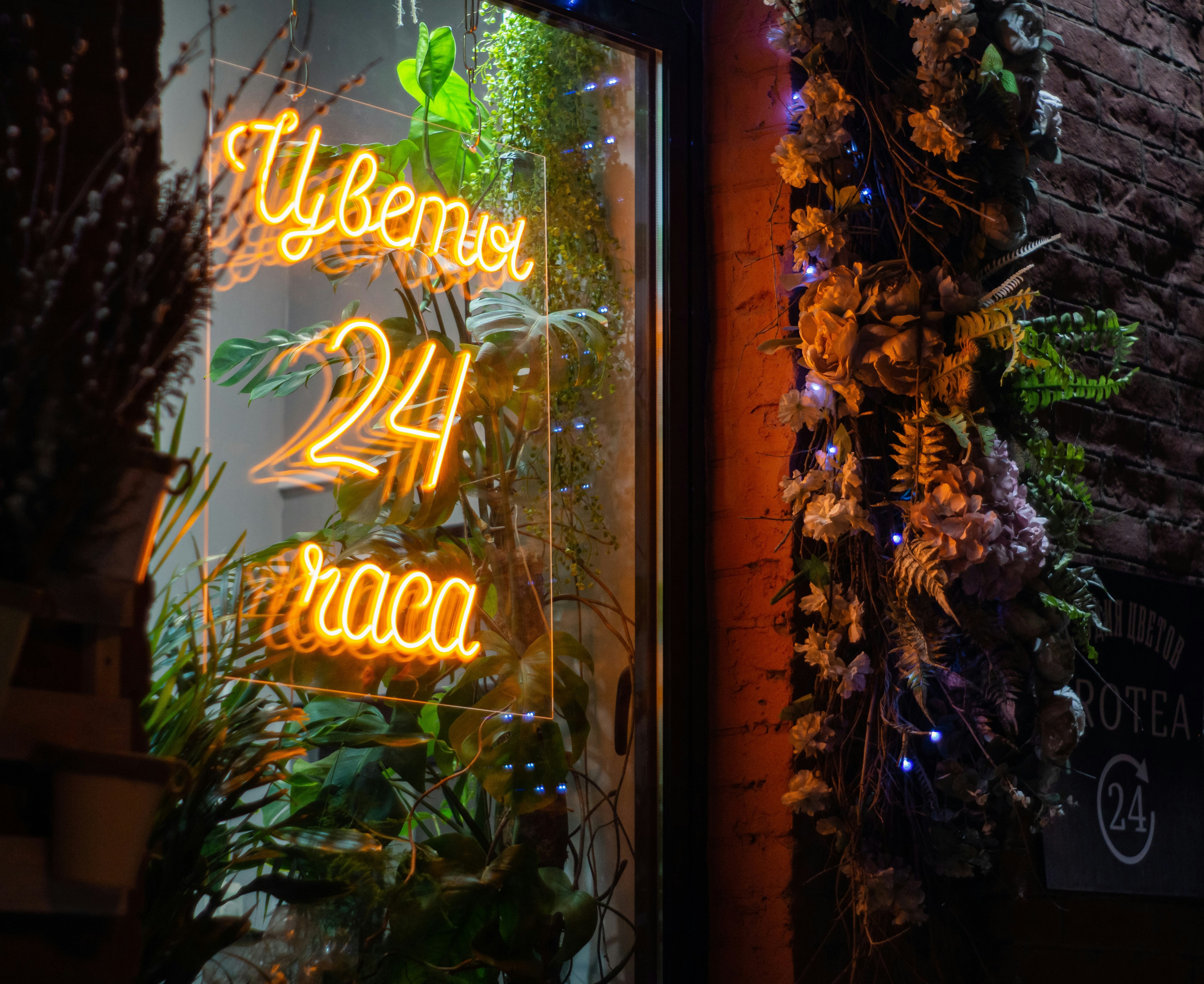Neon Florals in a Night-Window Display