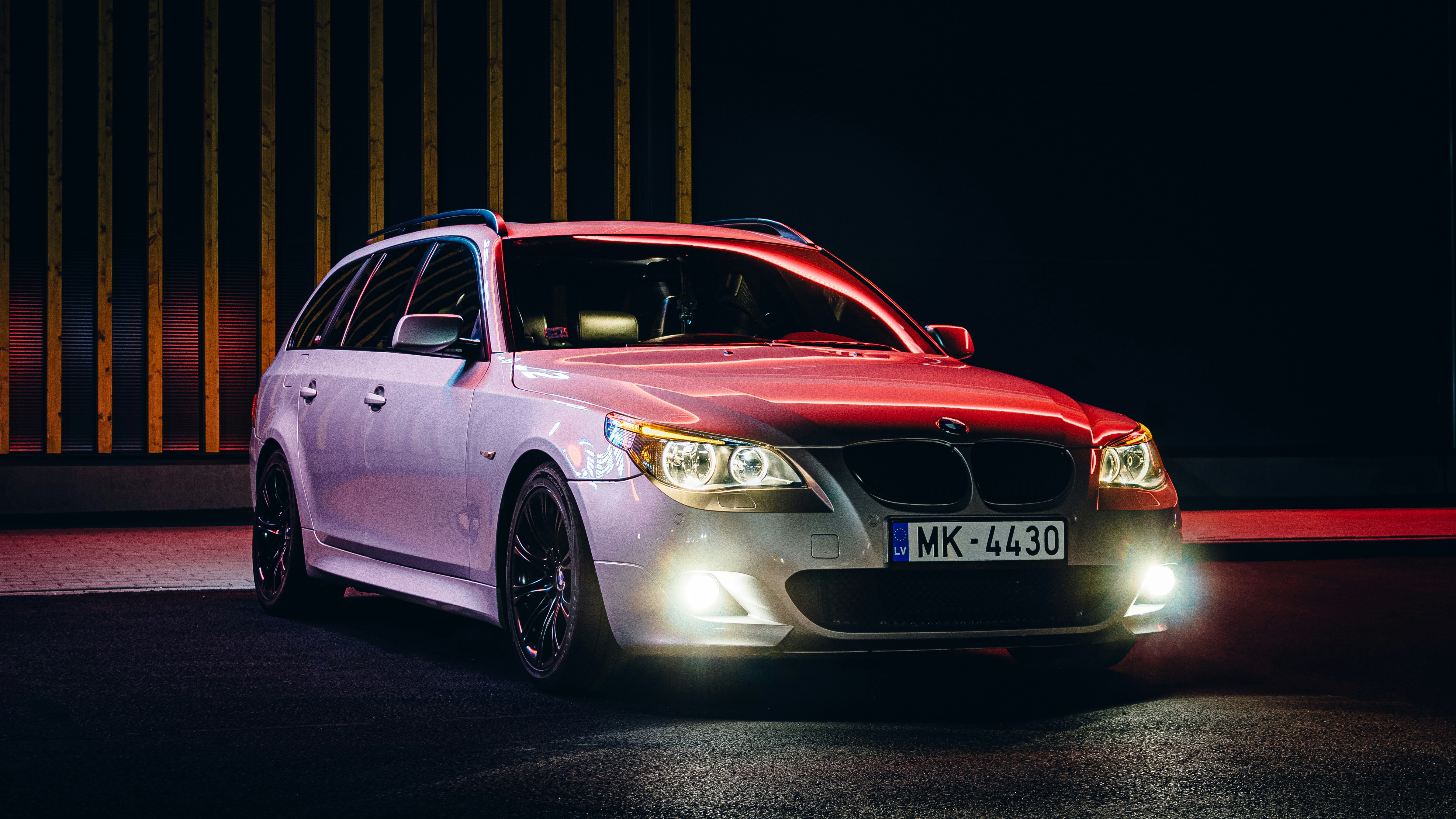 Midnight Neon: BMW 3 Series Touring under Urban Red Glow