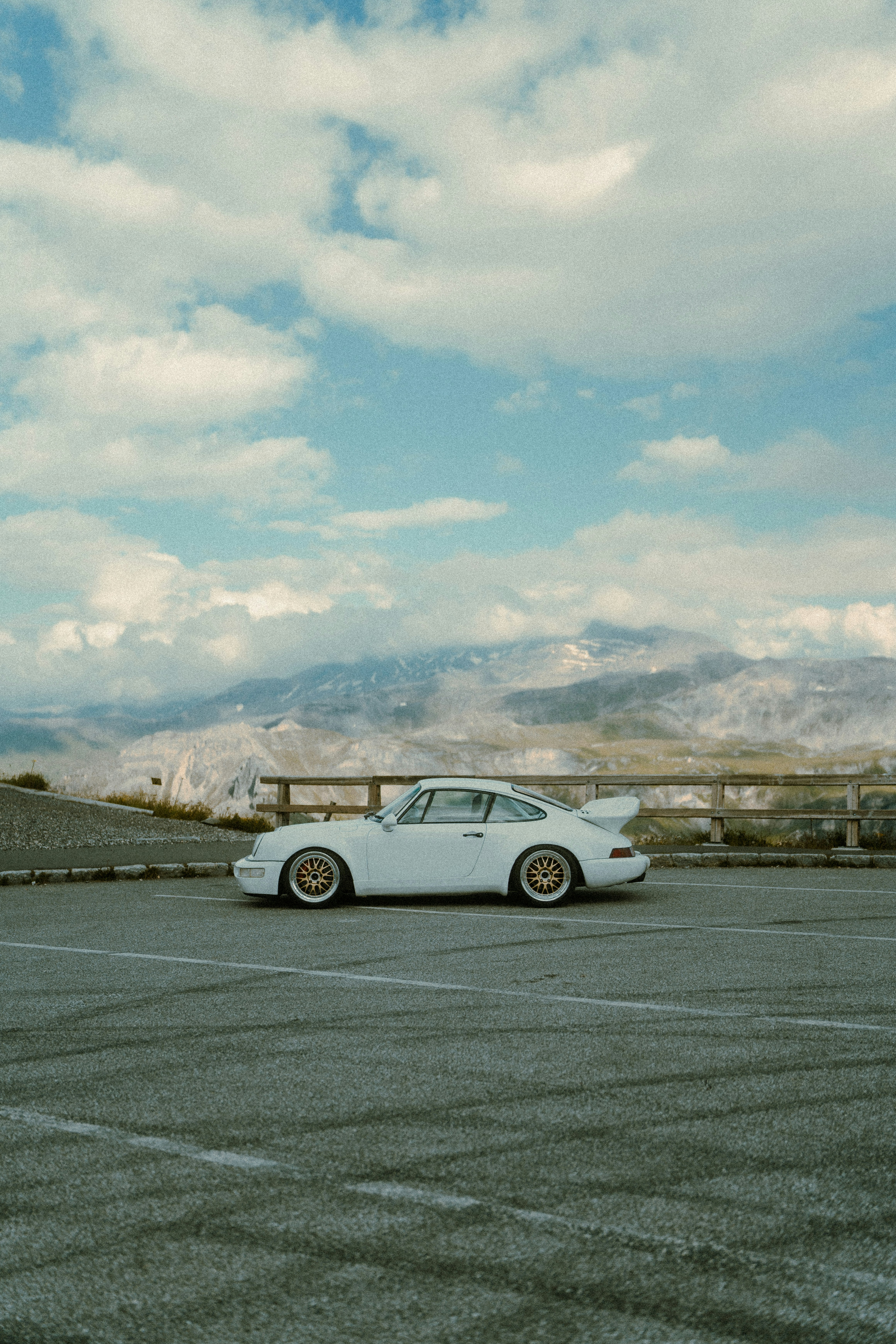 White Porsche in an Open Summit Parking Lot