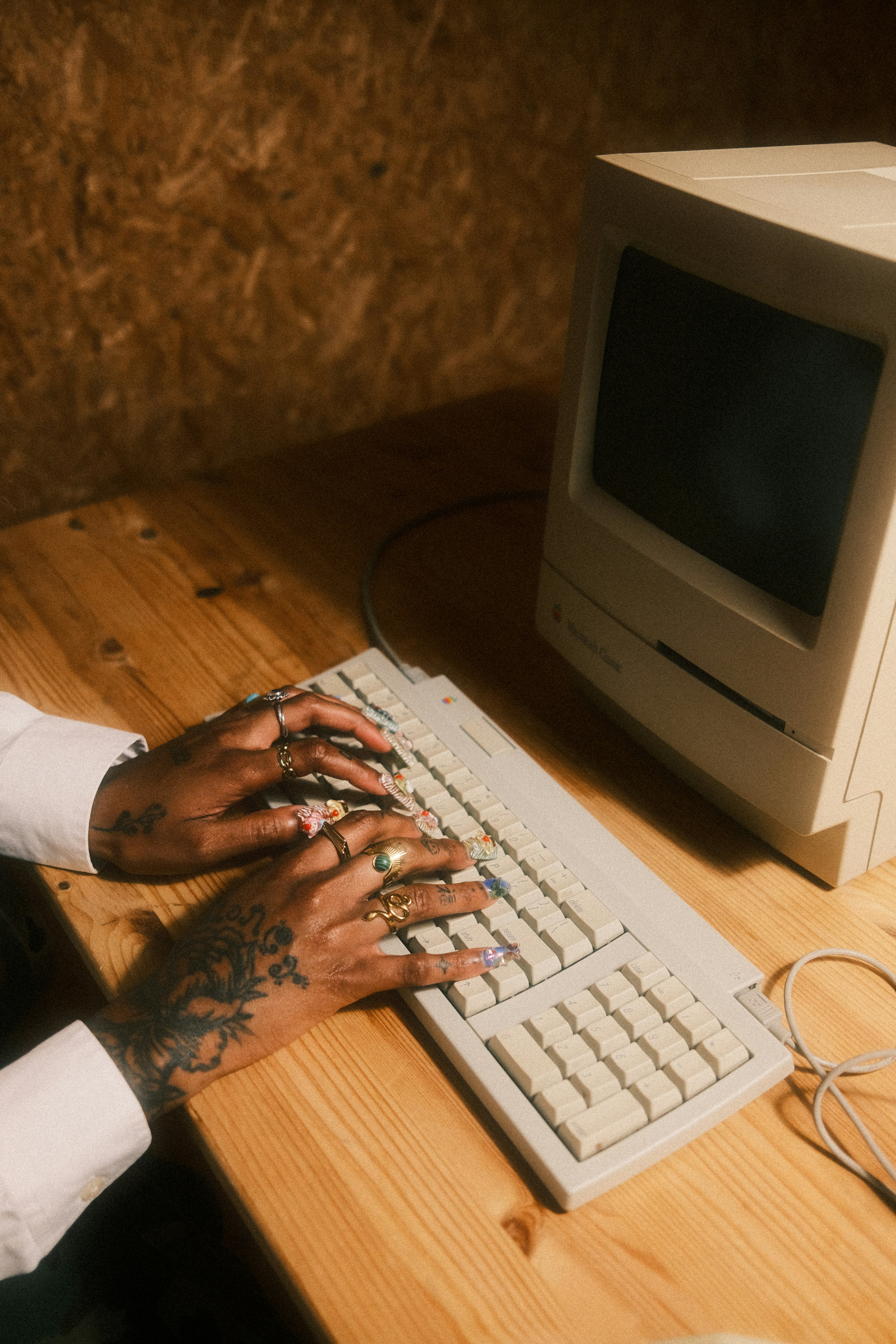 A woman is typing on a computer keyboard photo – Free Old computer ...
