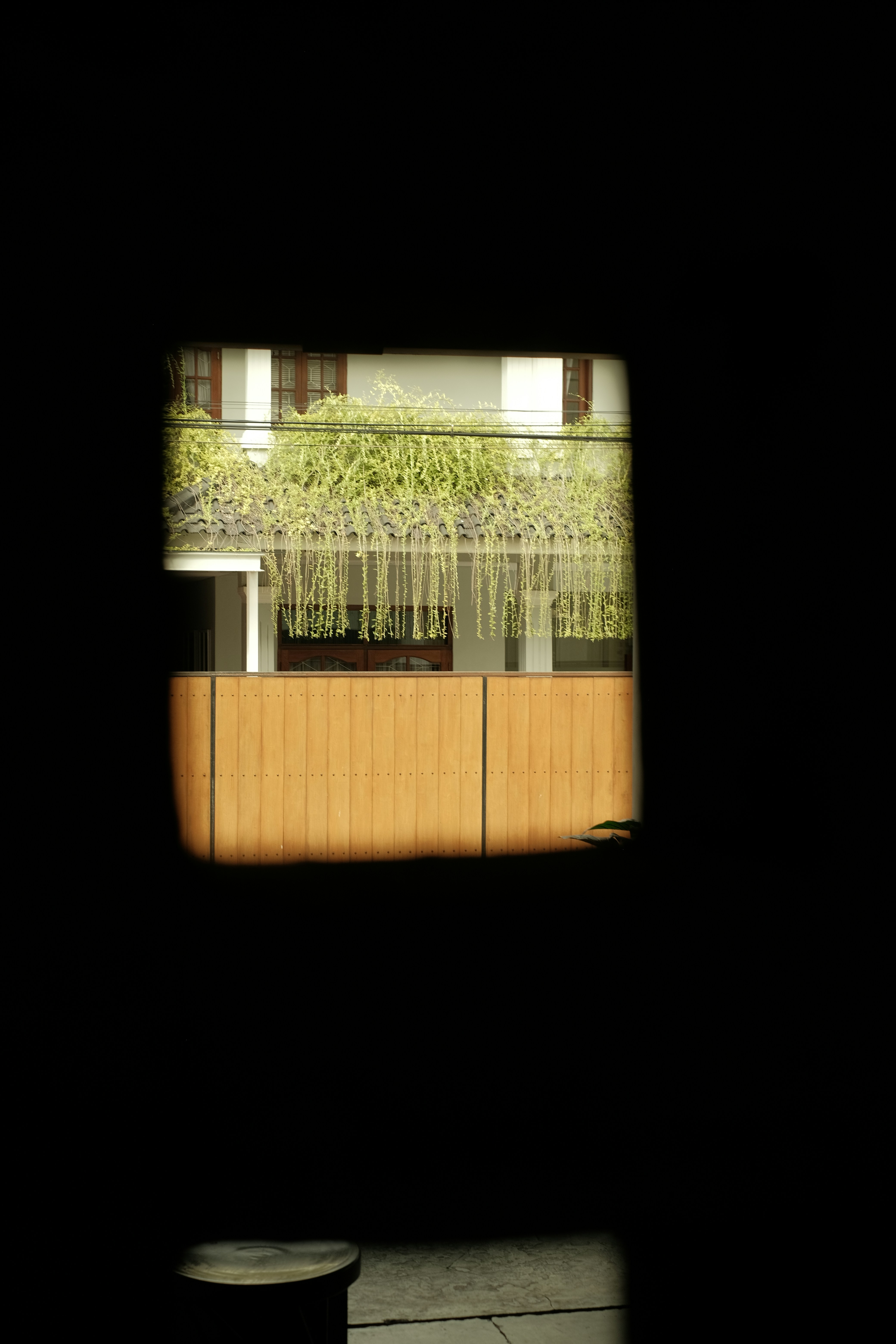 Framed View Through a Narrow Aperture