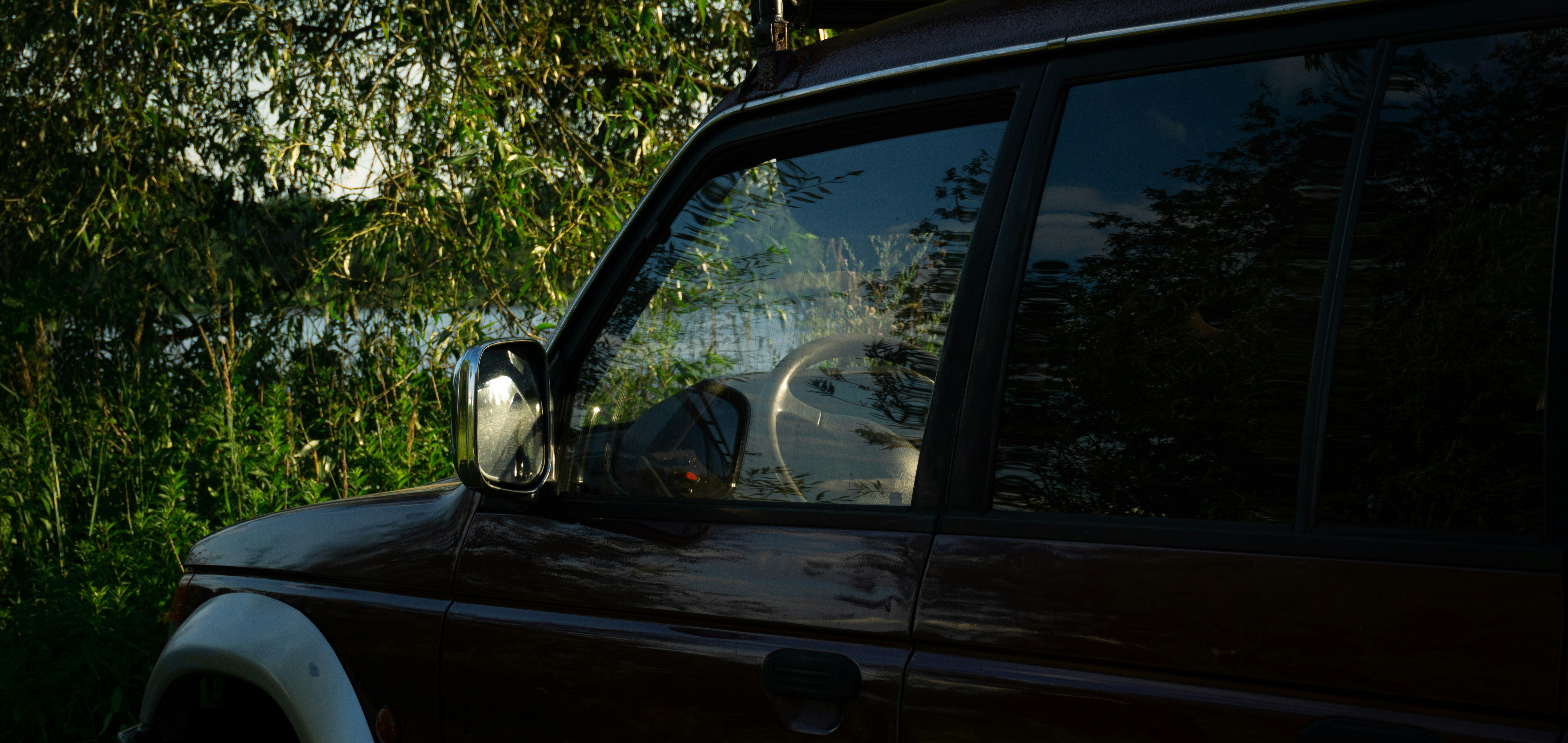 Mid‑Century SUV Velvet Night: A Dark Cache of Reflections