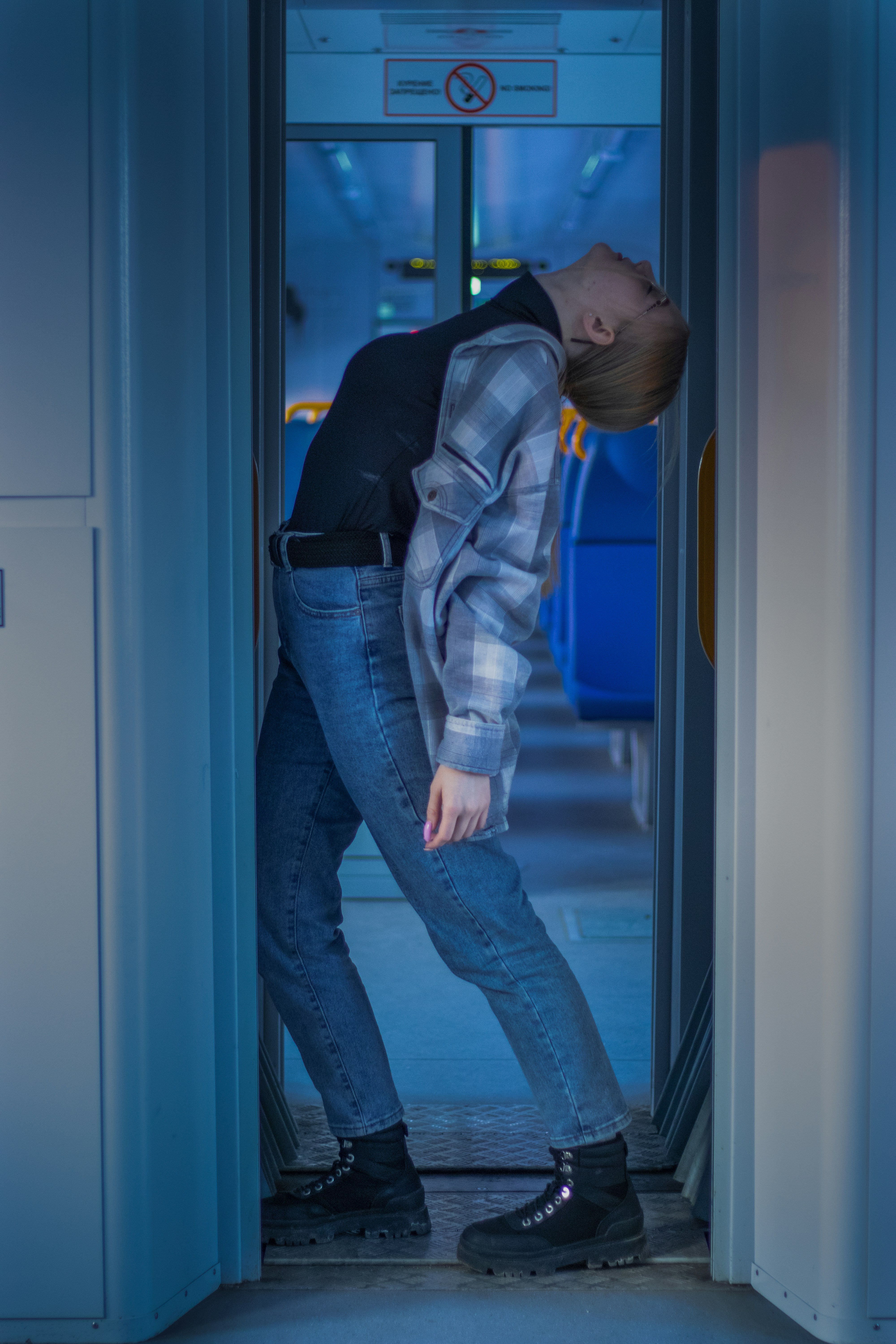 Backlit in Blue: A Youthful Lean Into the Exit