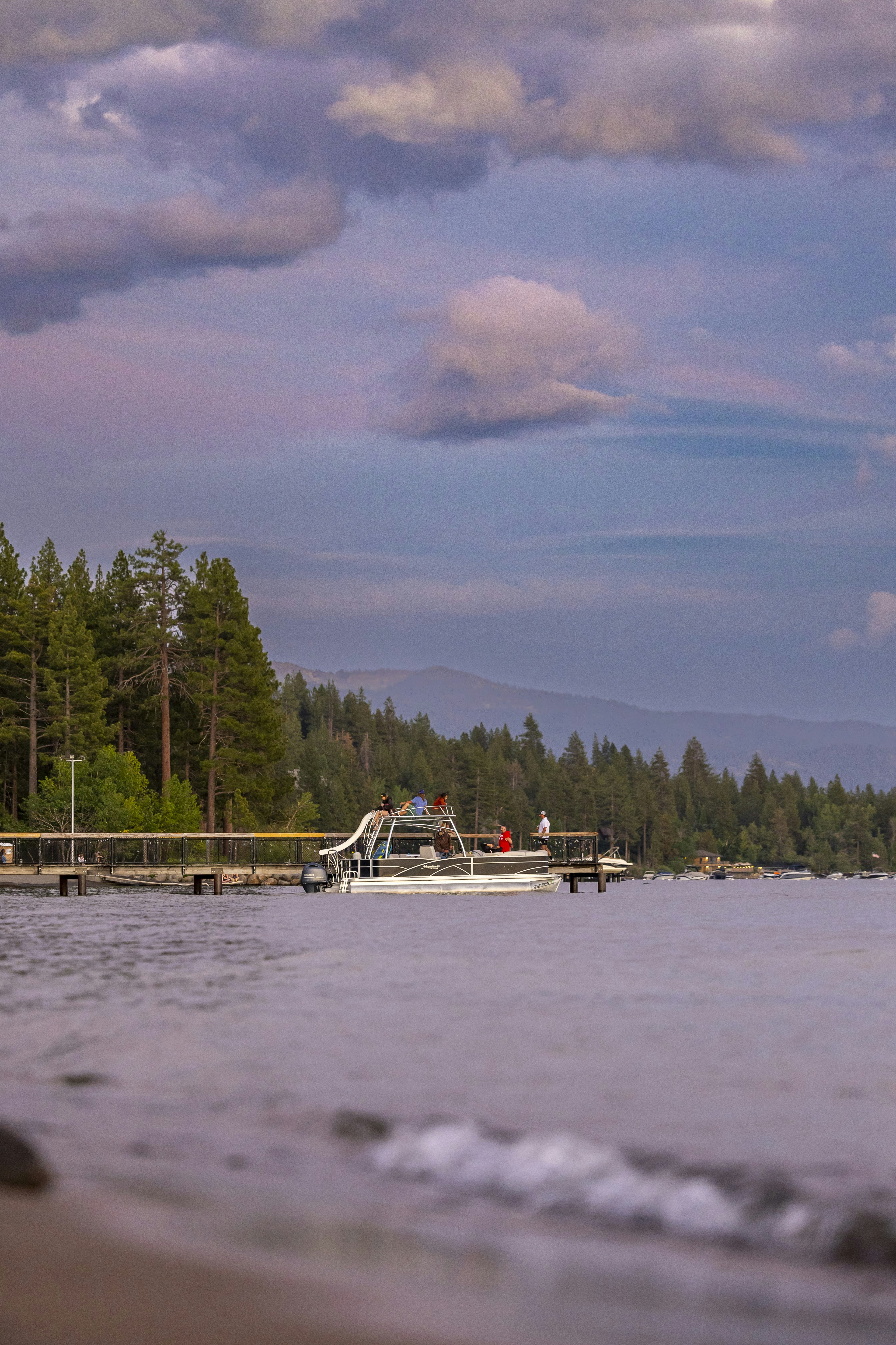 Boat at the Lakefront: Quiet Dusk by the Pine-Embraced Shore