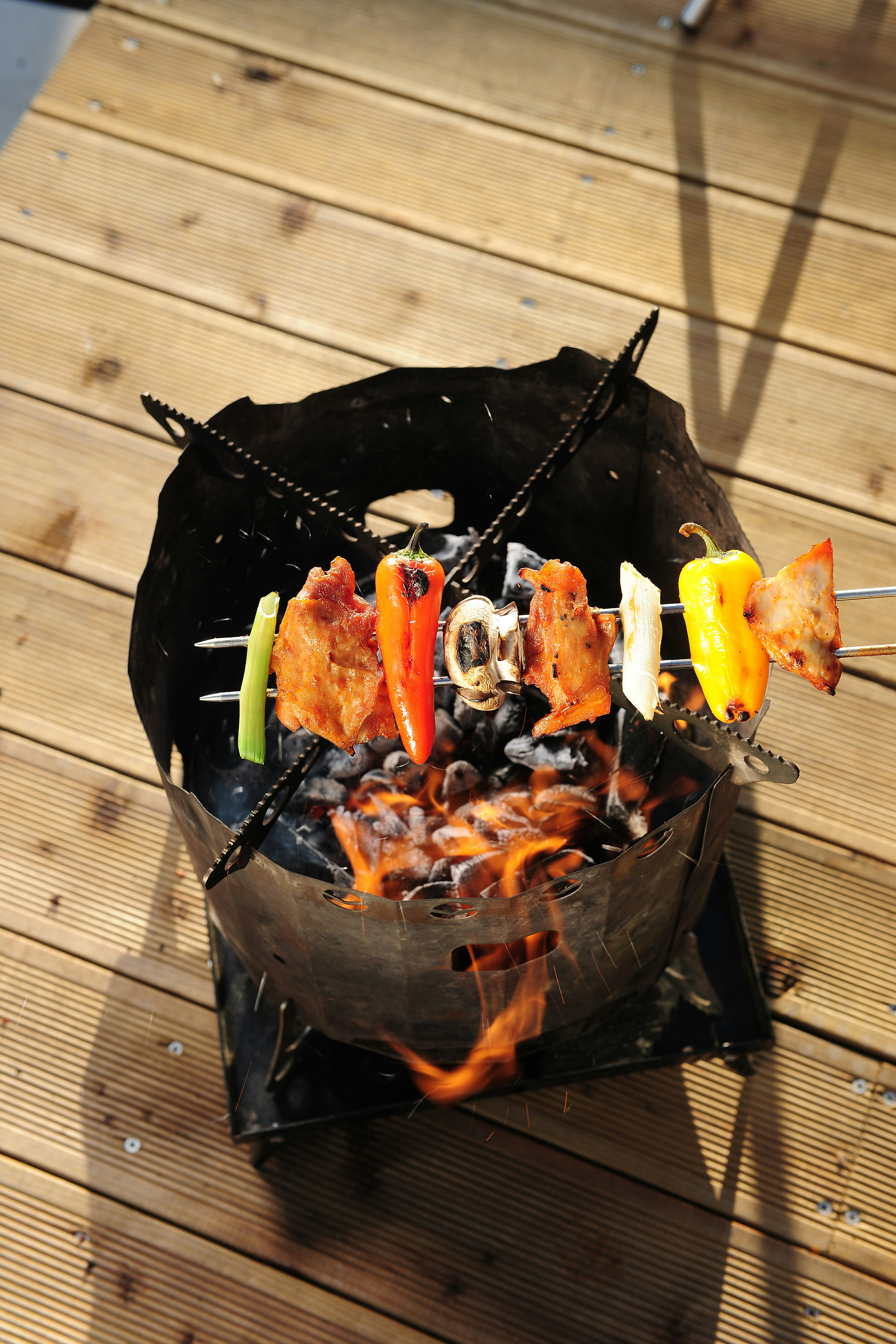 Deckside Skewers: A Rainbow of Peppers Over Glowing Coals