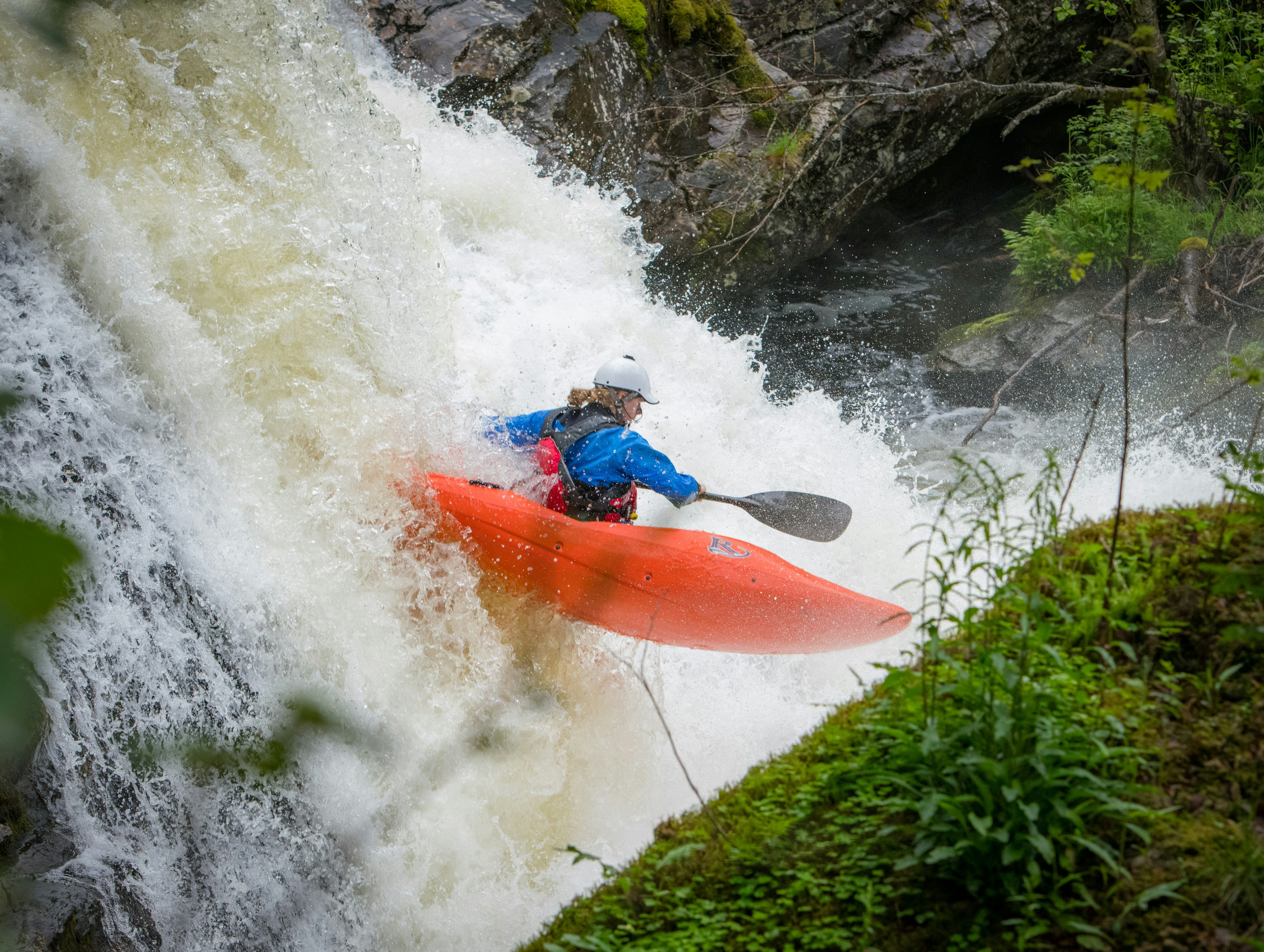 A man riding a kayak on top of a river photo – Free Kayak Image on Unsplash