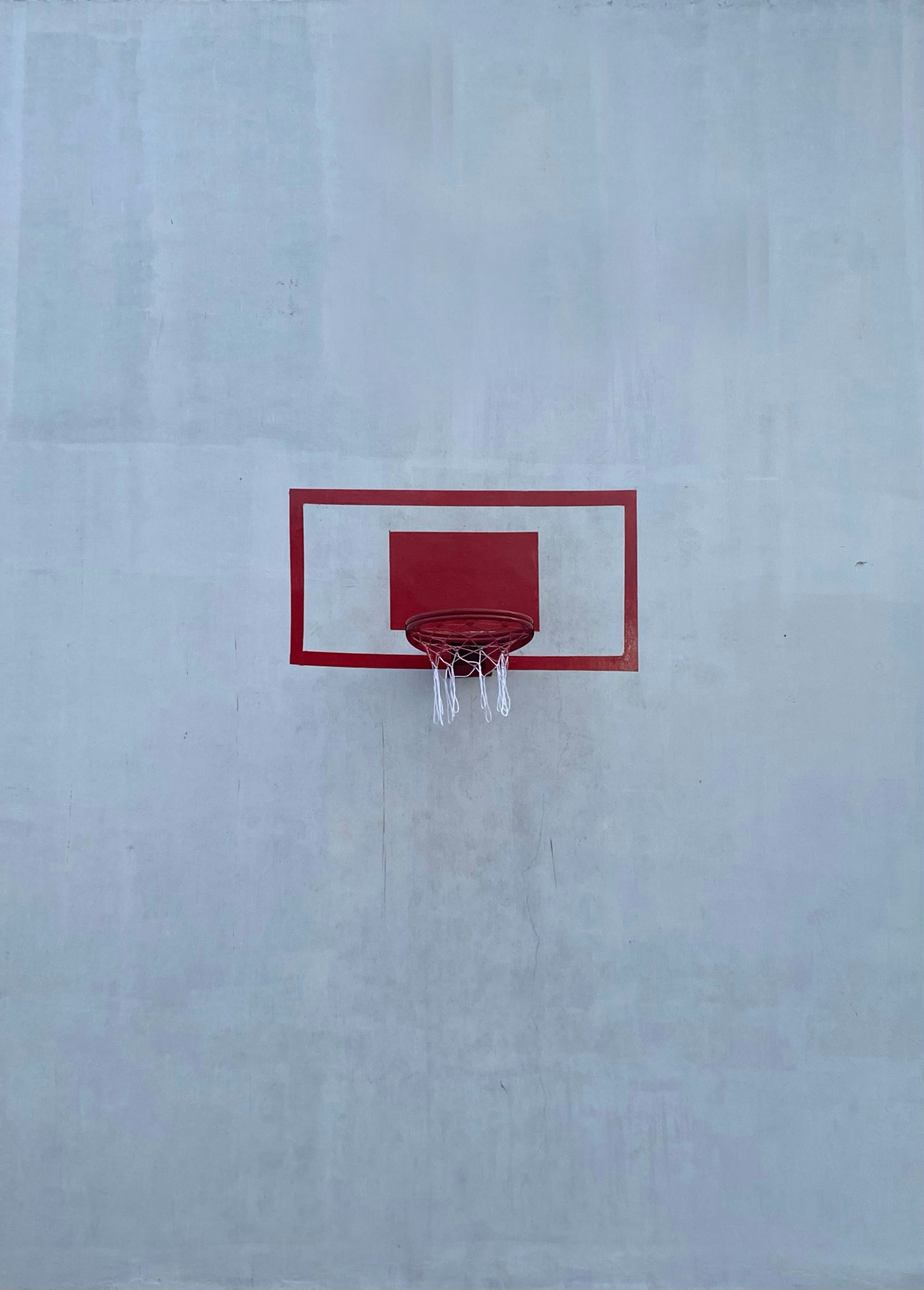 A basketball hoop with a red backboard on a white wall photo – Free ...