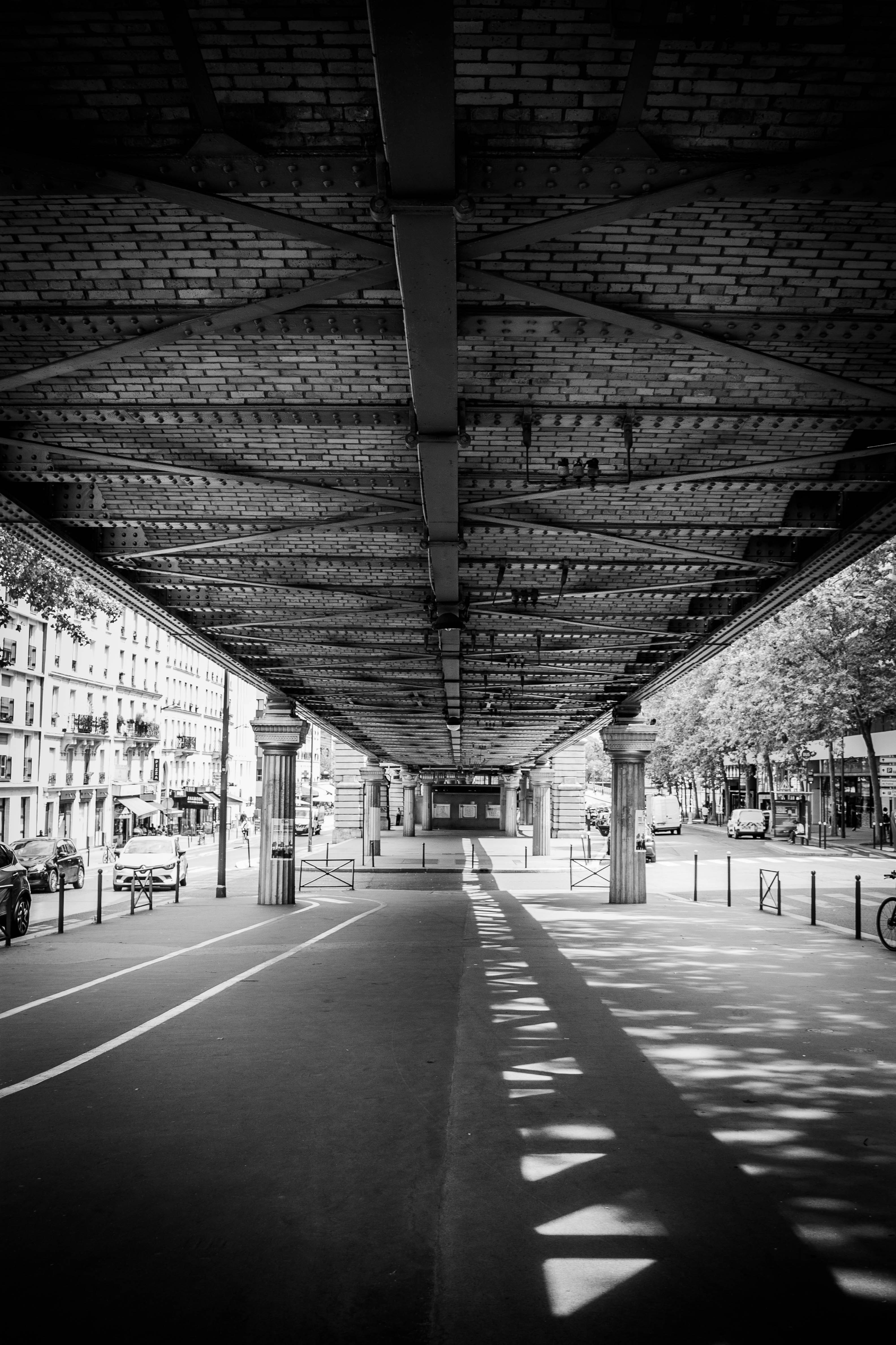 Undercast of Steel: Street Beneath the Bridge