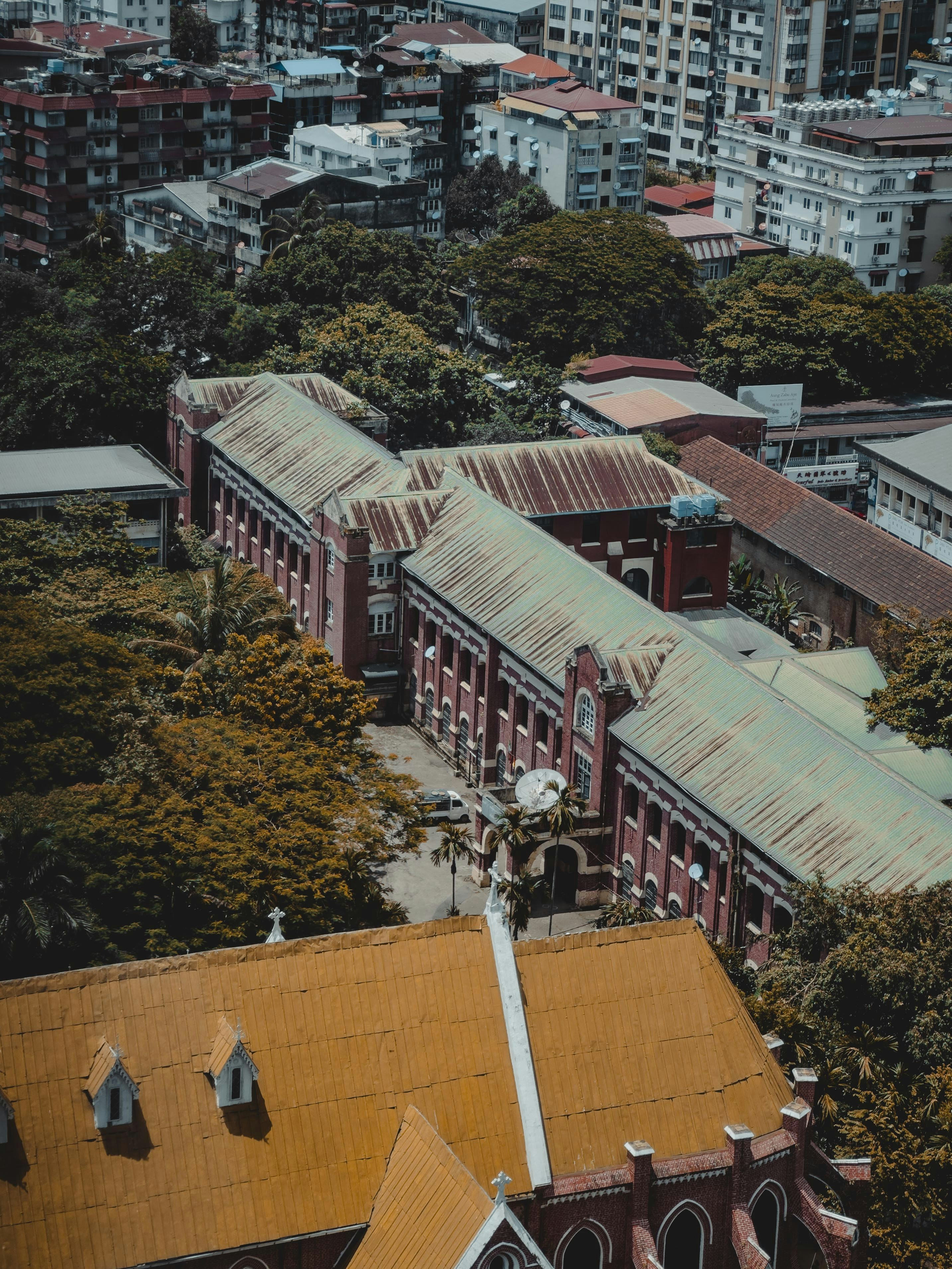 An aerial view of a city with tall buildings photo – Free Government ...