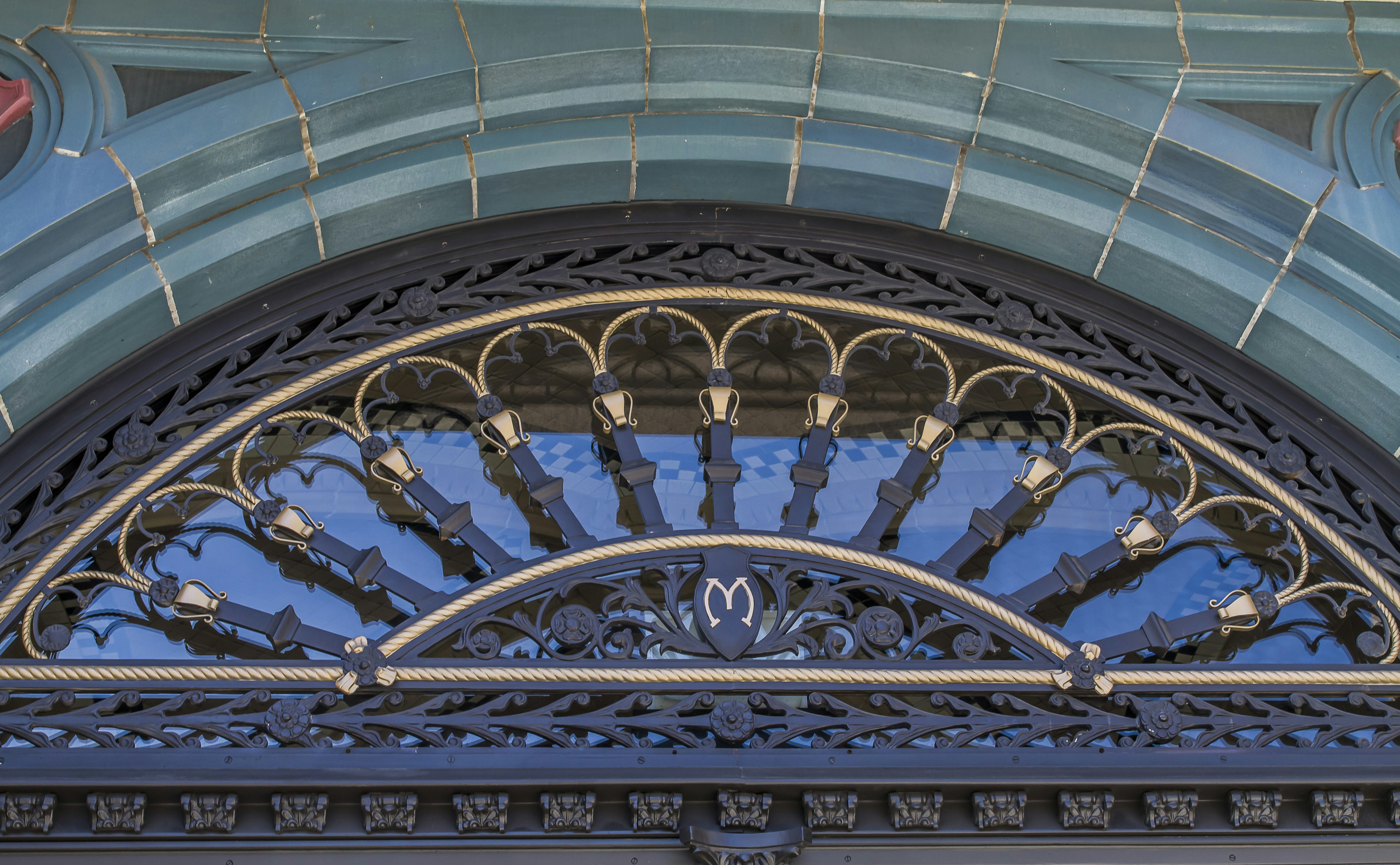 Architecture detail on old building in Chicago. | a clock on the side of a building