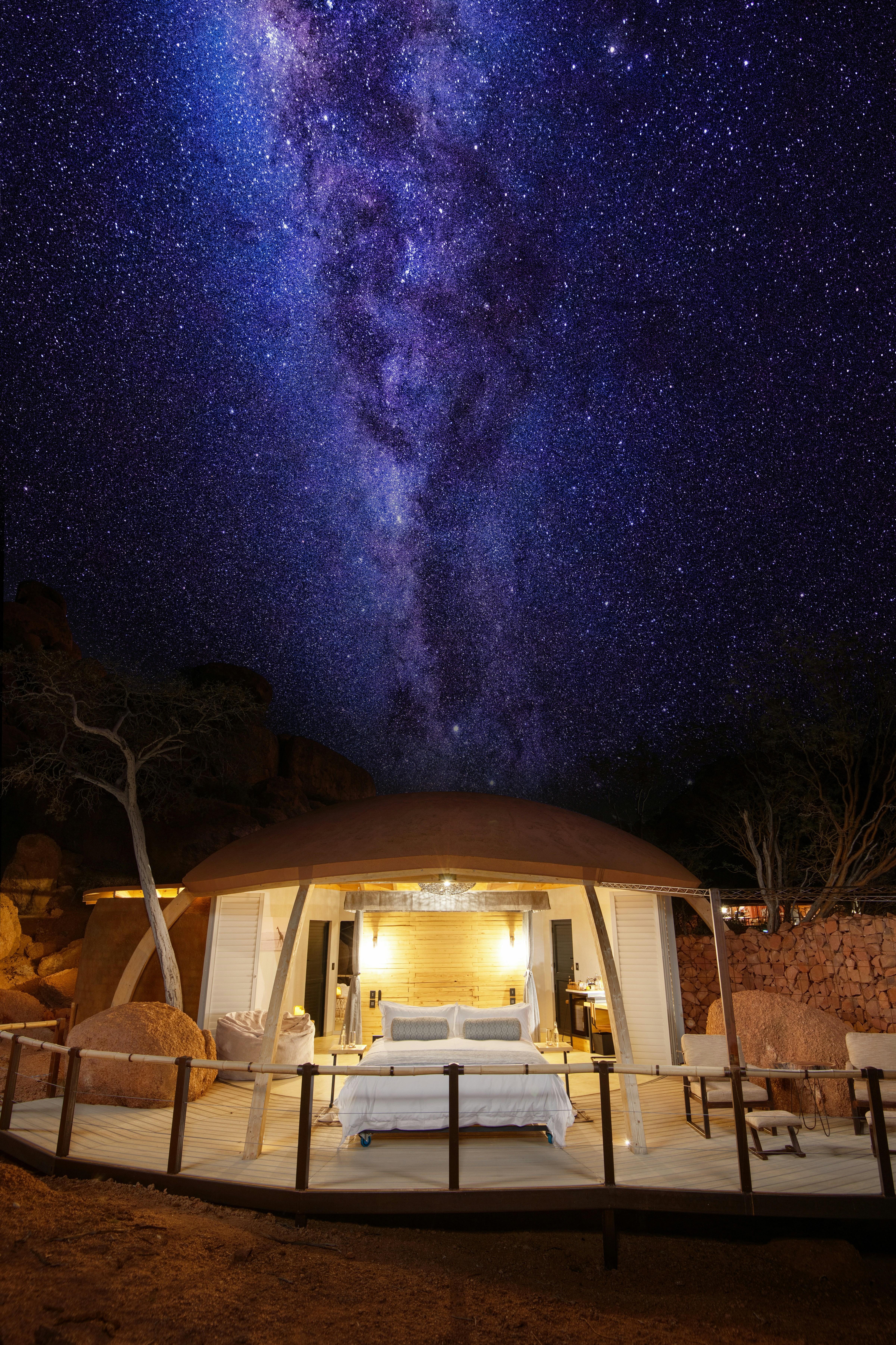 A bed sitting under a night sky filled with stars photo – Free Star ...
