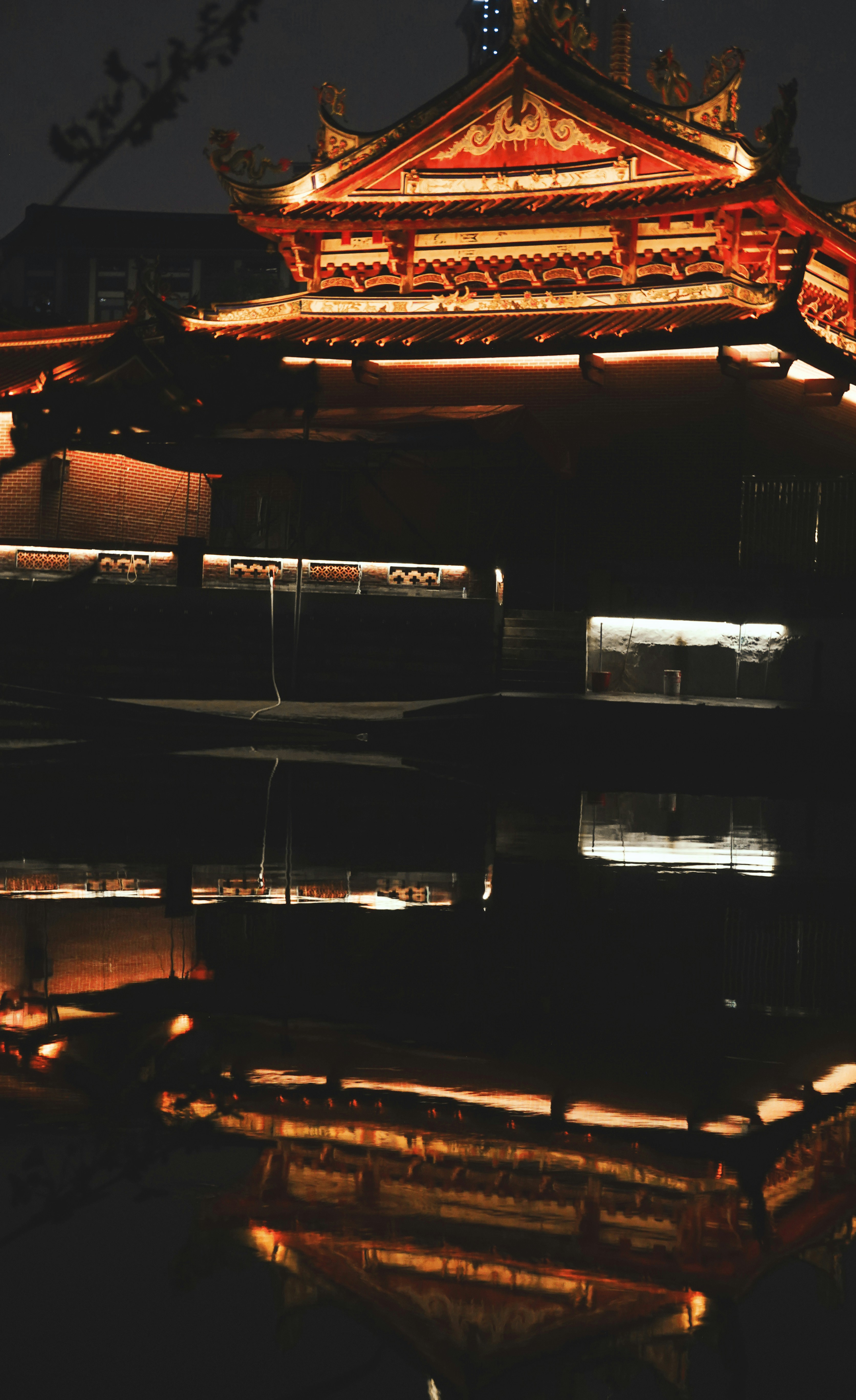 Ember-lit Pavilion Over Quiet Water: Night Temple Reflections