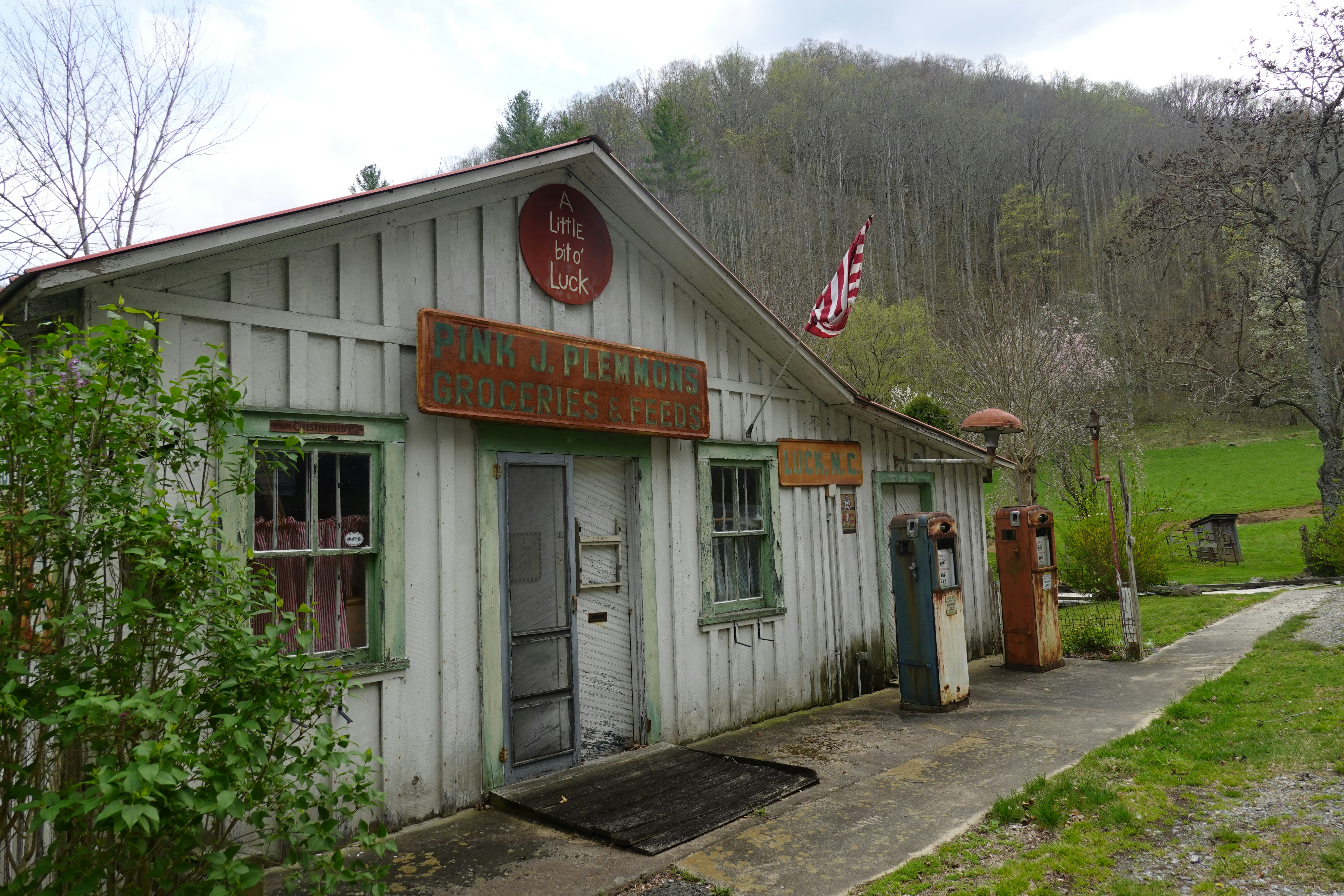 Weathered General Store by the Valley Road, Vintage Pumps in the Dust