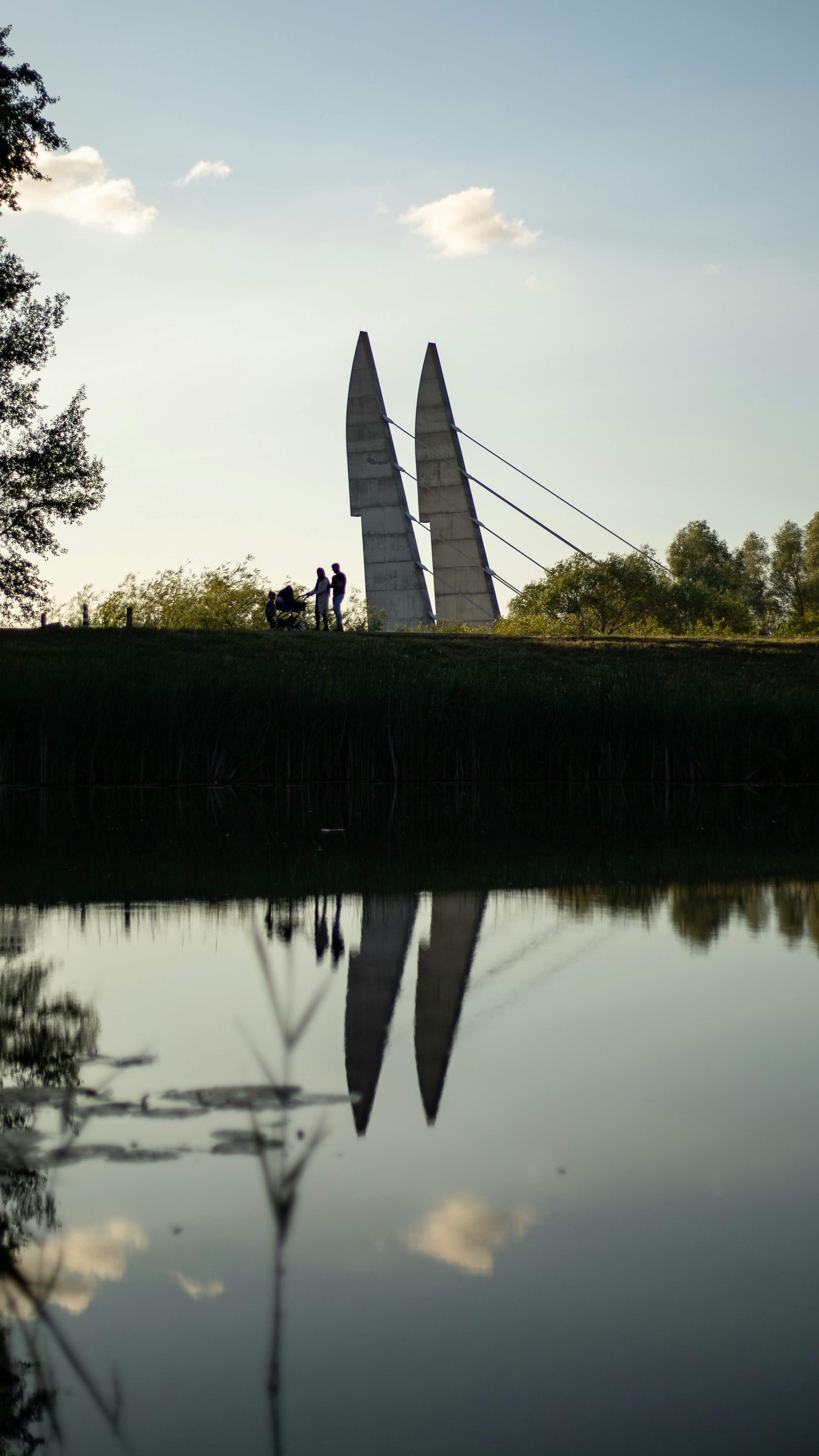 Twin Spires by the Water: Silhouette of a Quiet Monument at Dusk