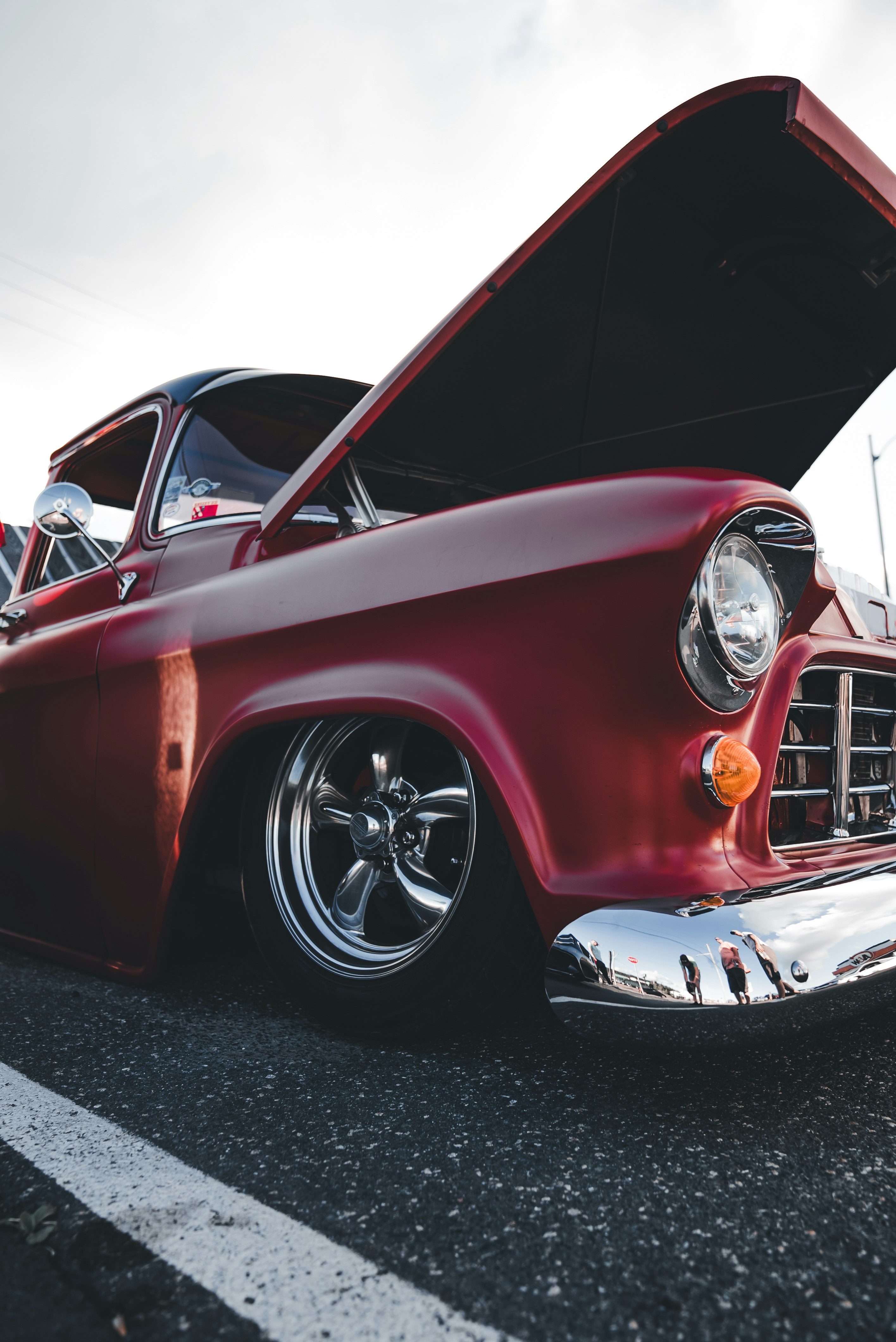 A red classic car with its hood open photo – Free Machine Image on Unsplash