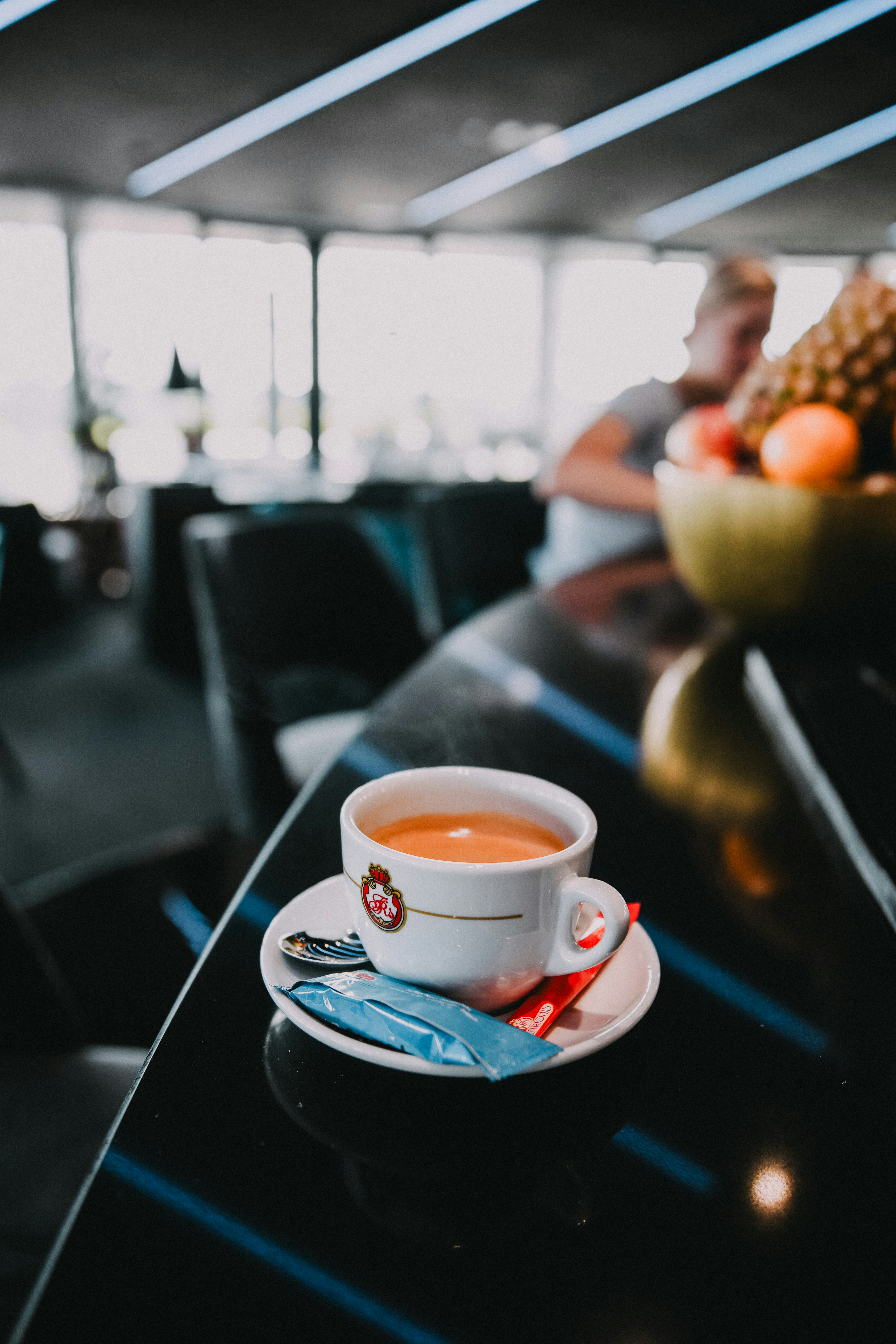 Crema on Glass: A Quiet Close-Up in a Modern Café