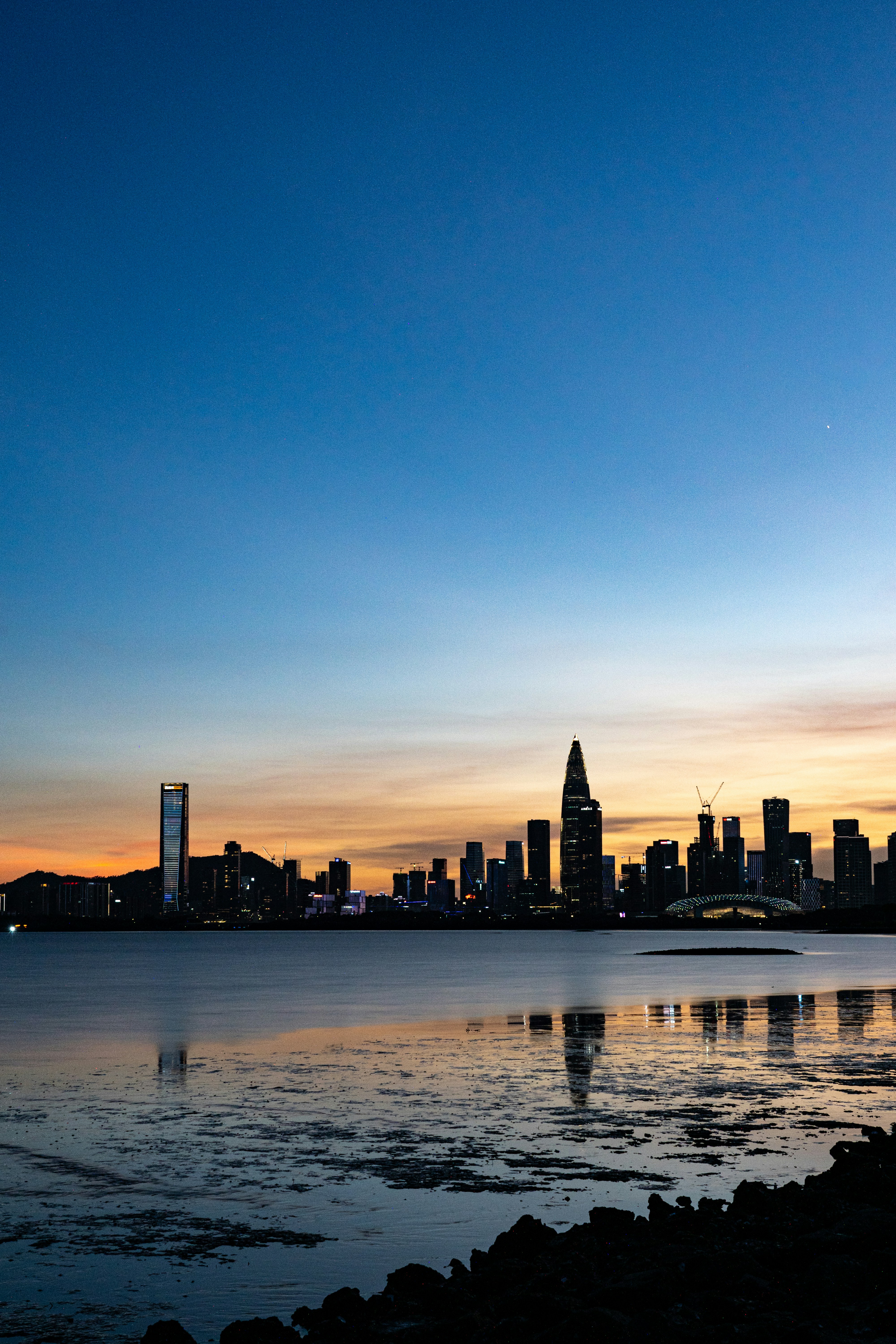 Last Light Over a City of Glass
