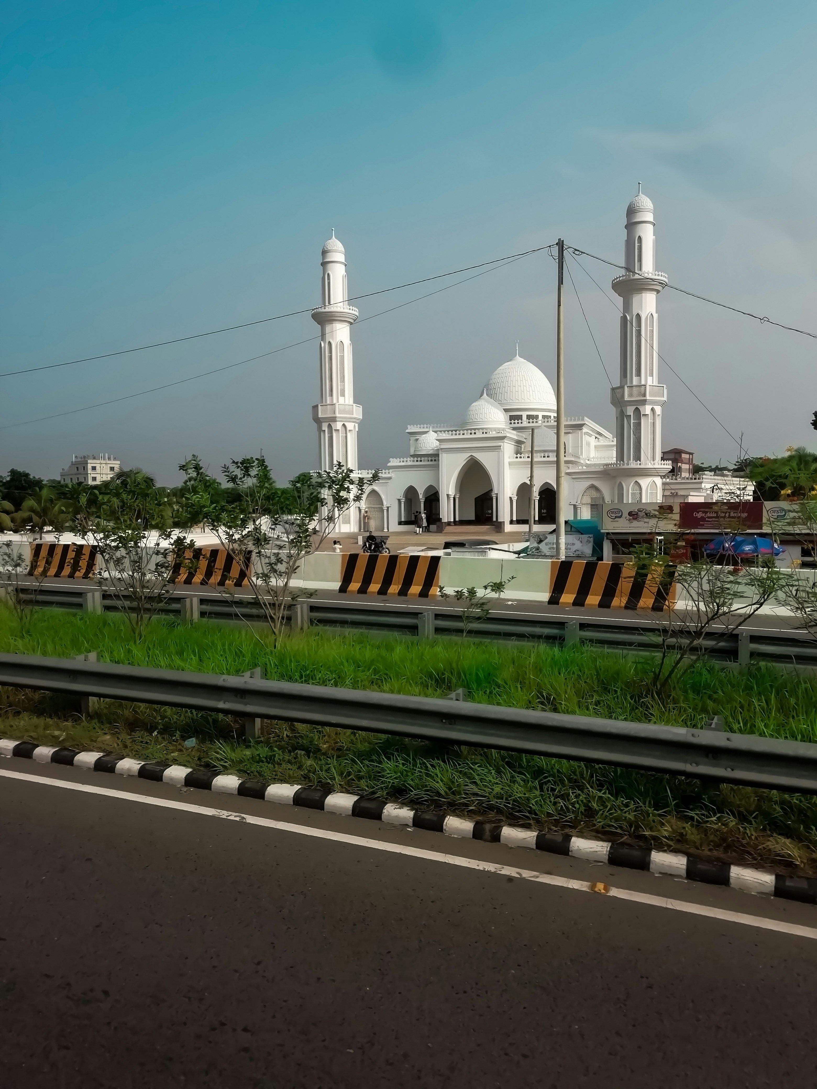 White Mosque Rise Above the Highway