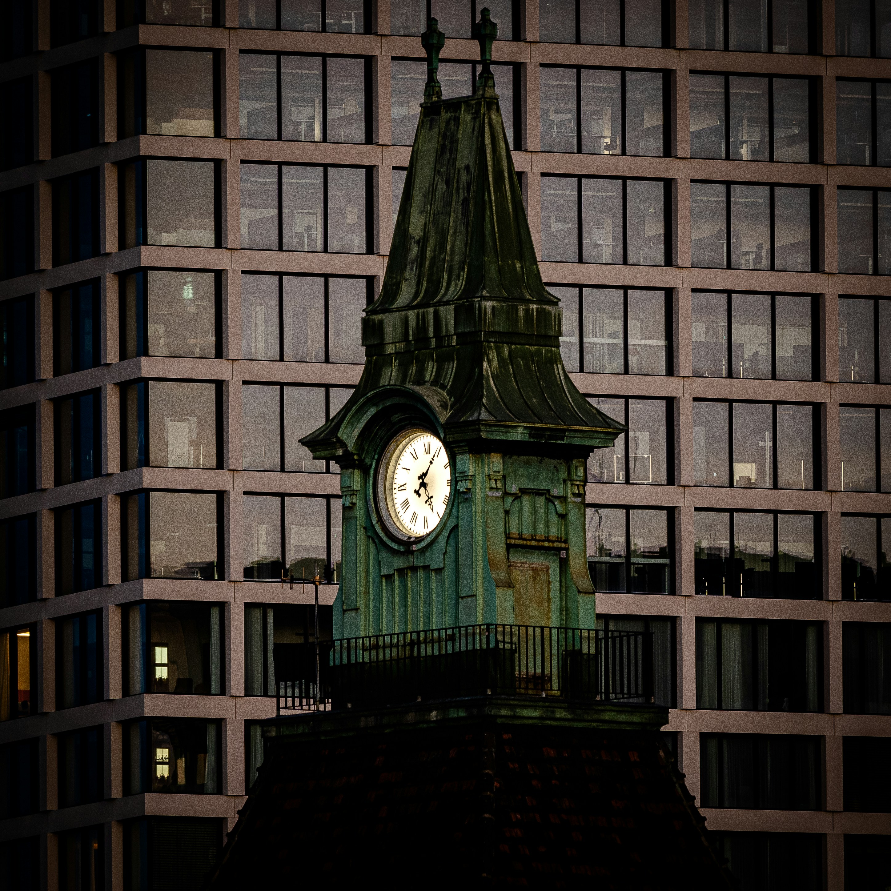 A large clock tower in front of a tall building photo – Free Basel ...