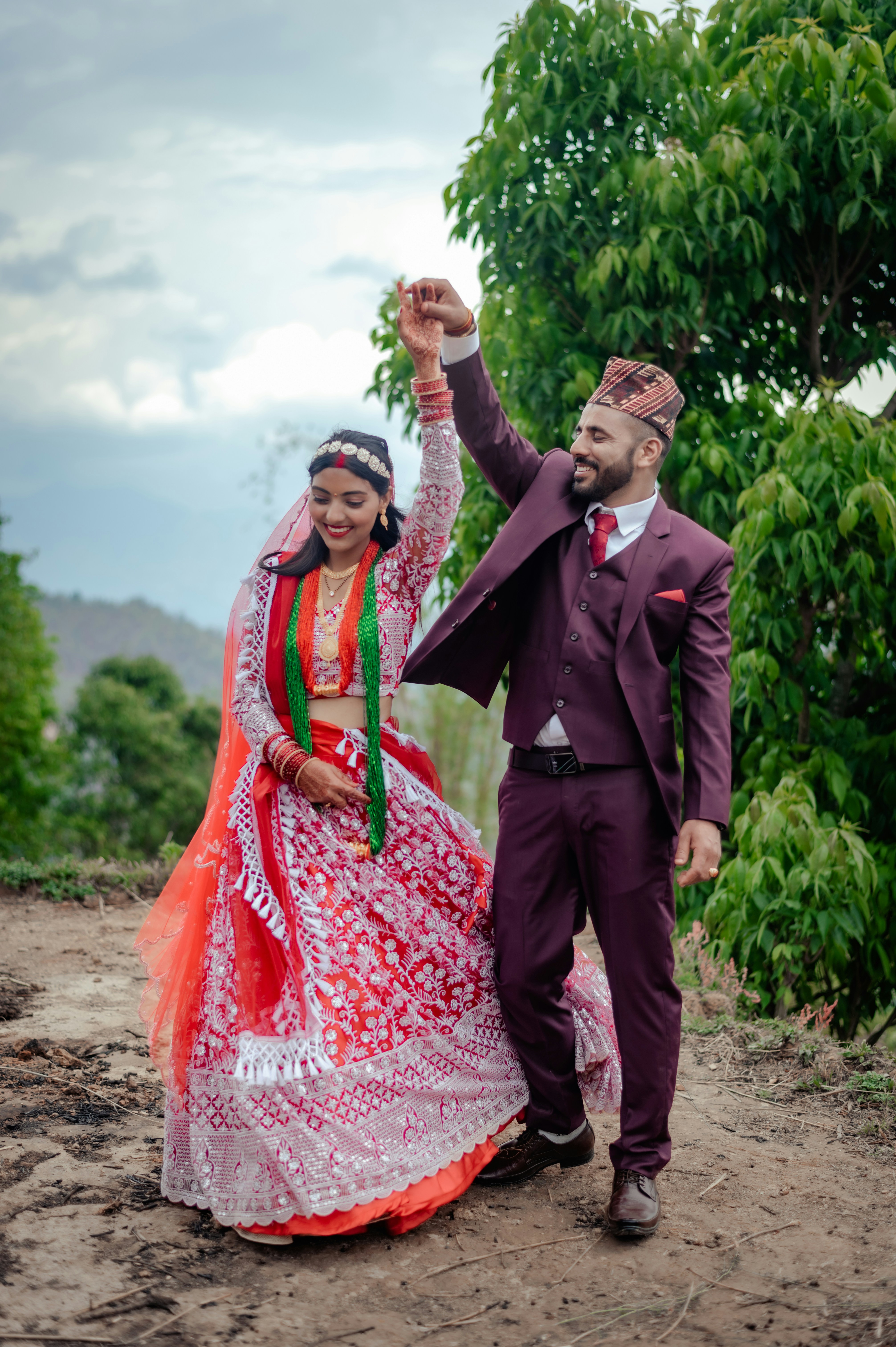 A man and a woman dressed in indian attire photo – Free Groom suit ...