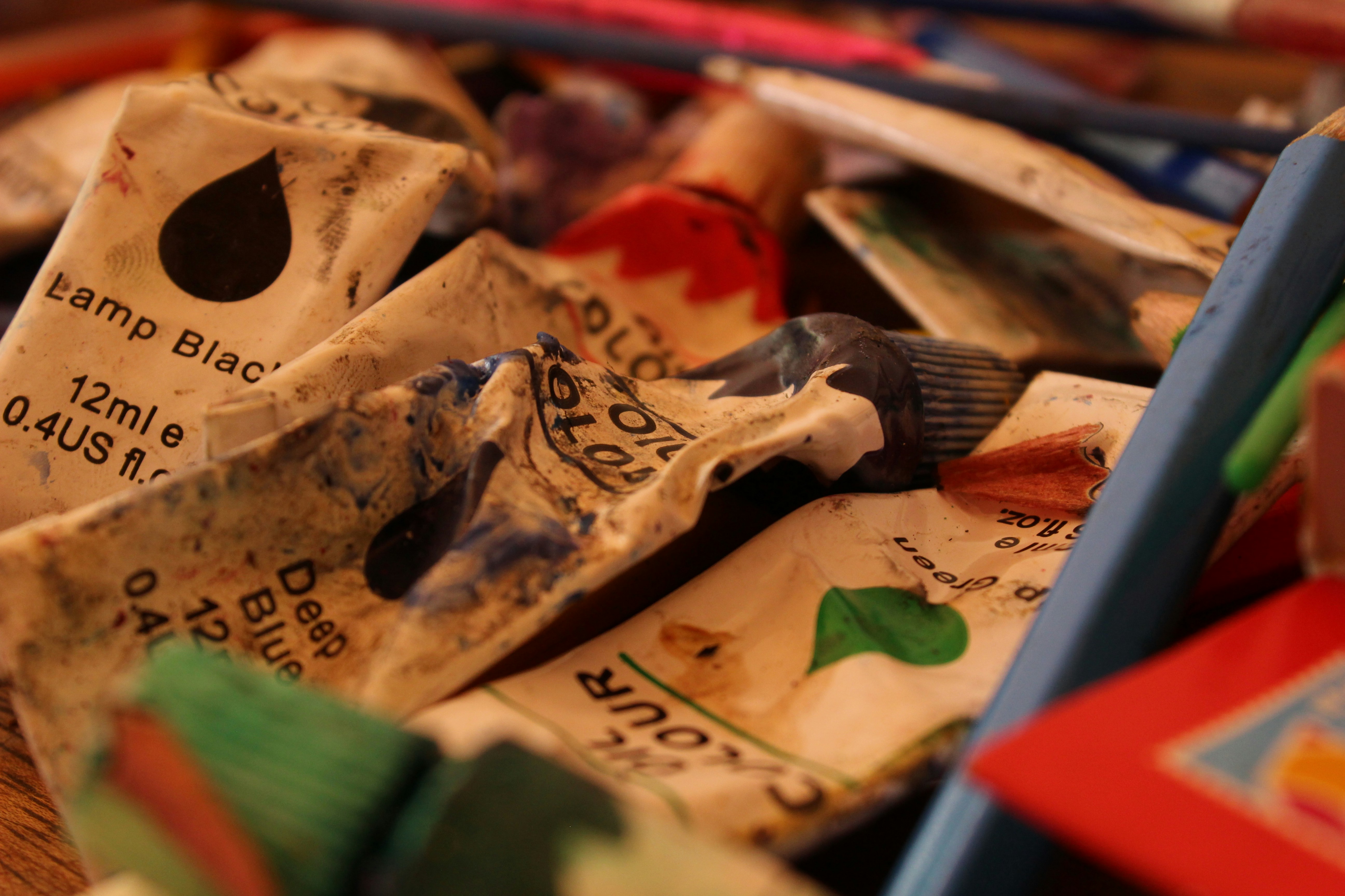 Paint-Splashed Mess: A Tangled Tangle of Crumpled Colors and Tools