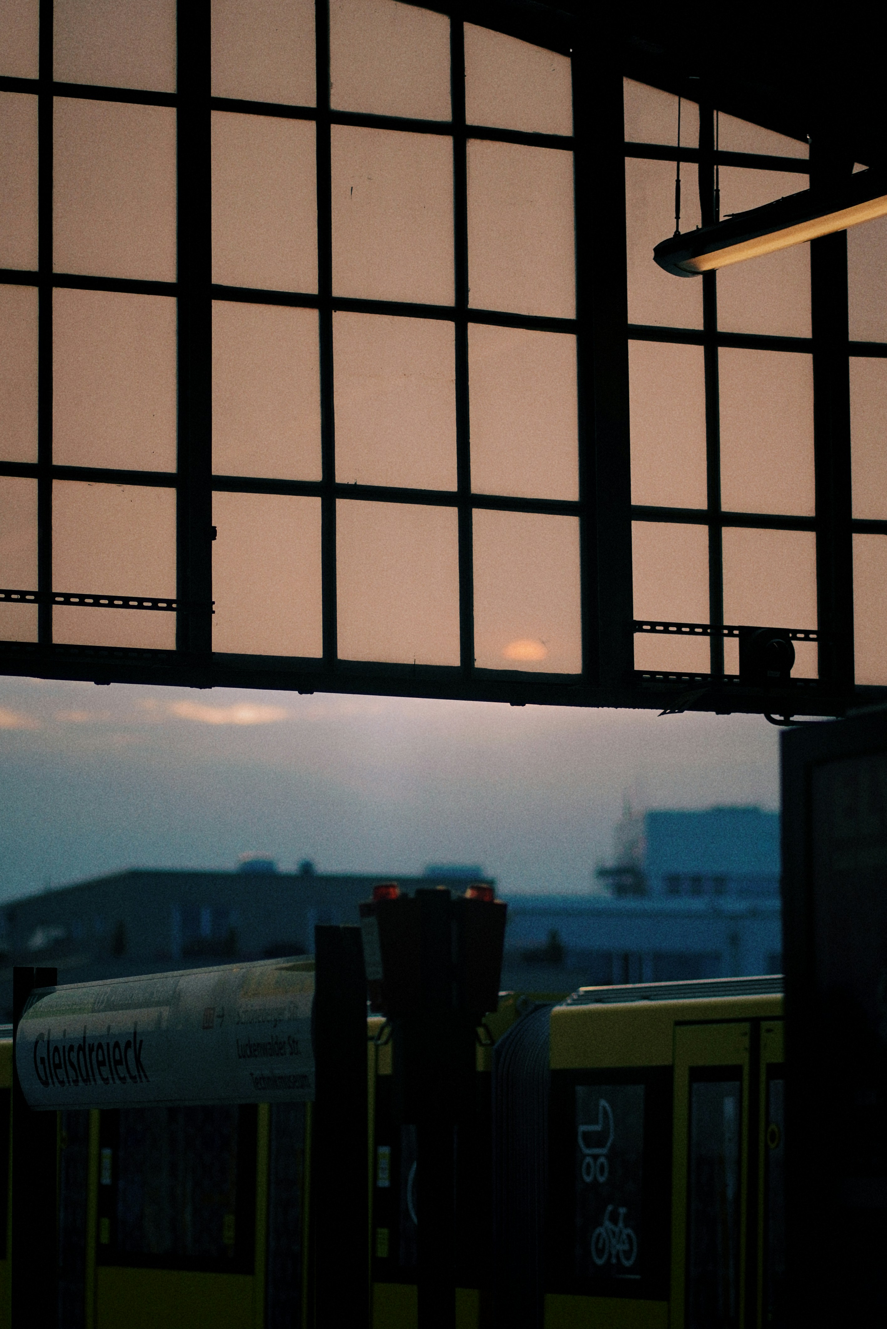 Urban Sunset Through a Grid of Windows