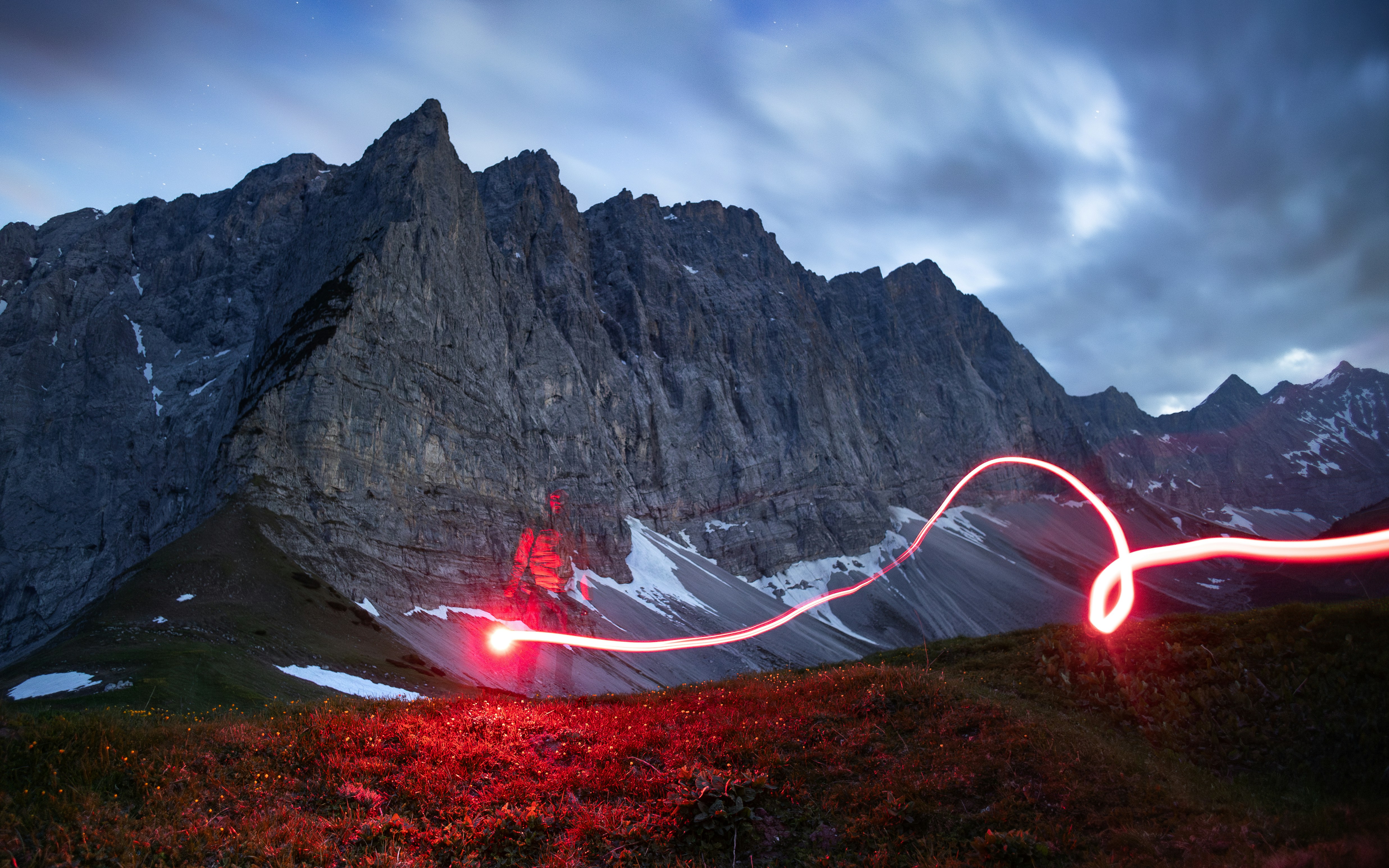 A long exposure photo of a person on a mountain photo – Free Light ...