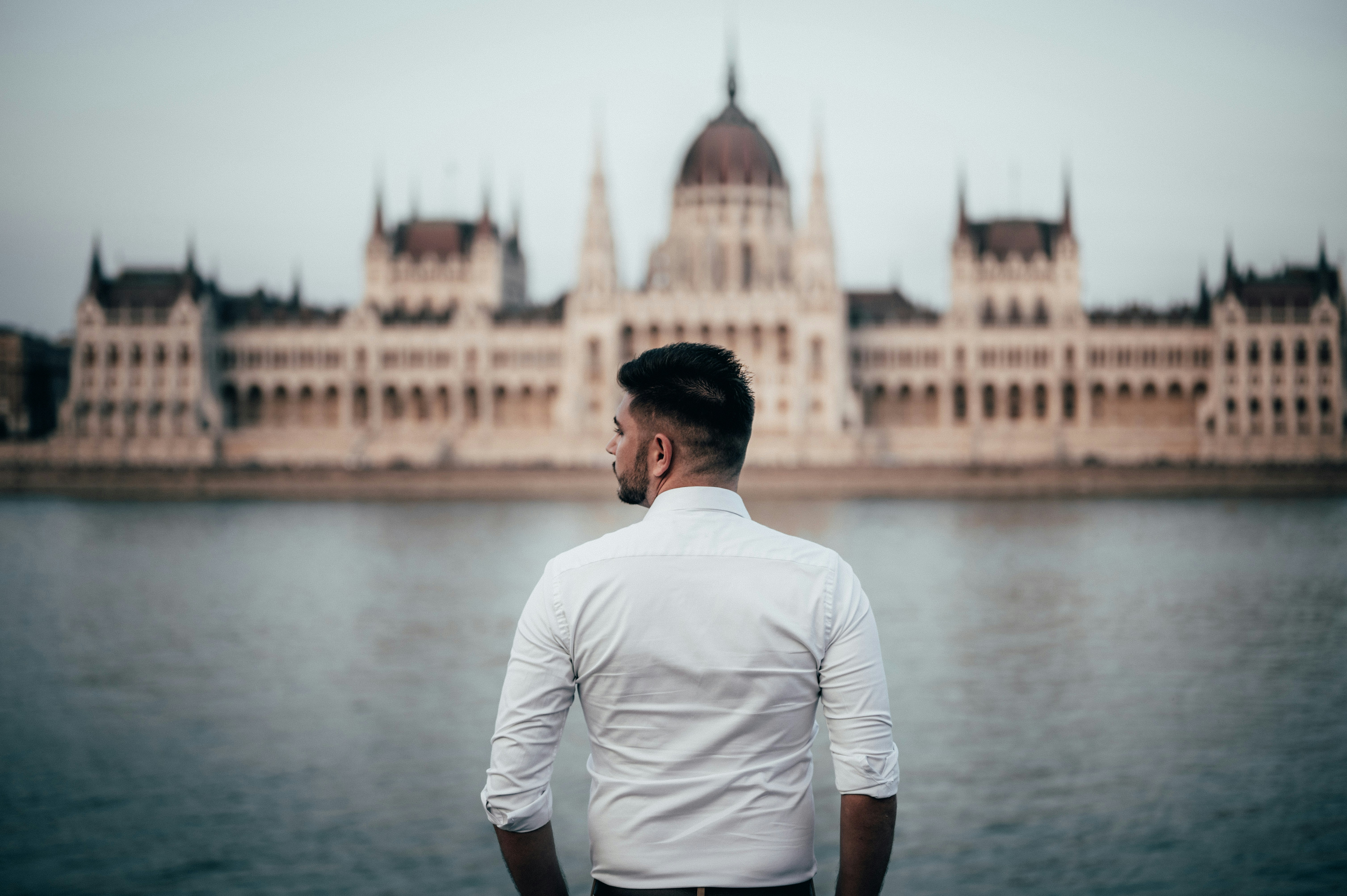 White Shirt, Hungarian Echoes: A Quiet Portrait Before the Parliament