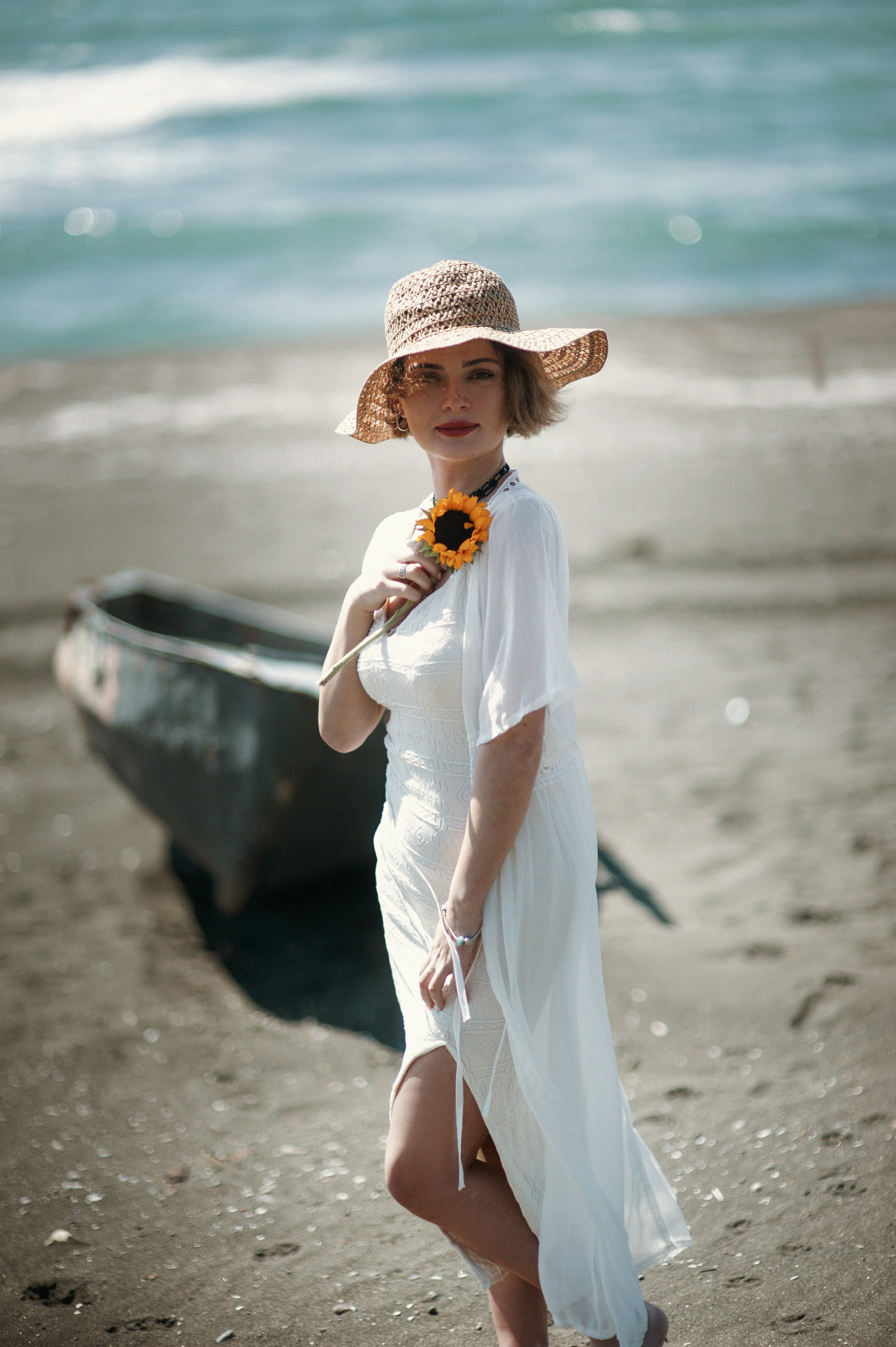 Sunlit Poise: A Sunflower Whisper by the Shore