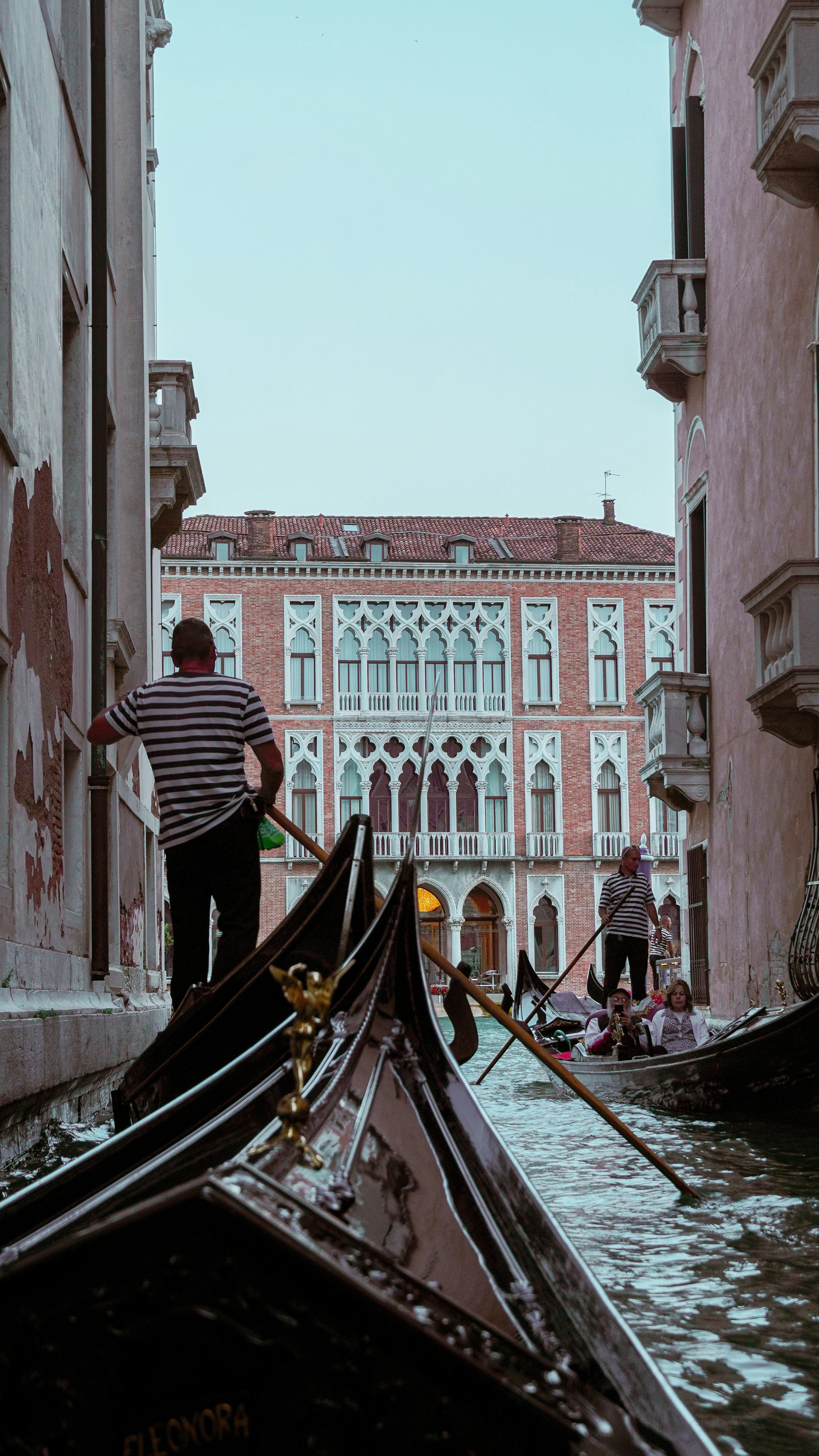 Gondola Passage: Narrow Canal Between Venetian Façades