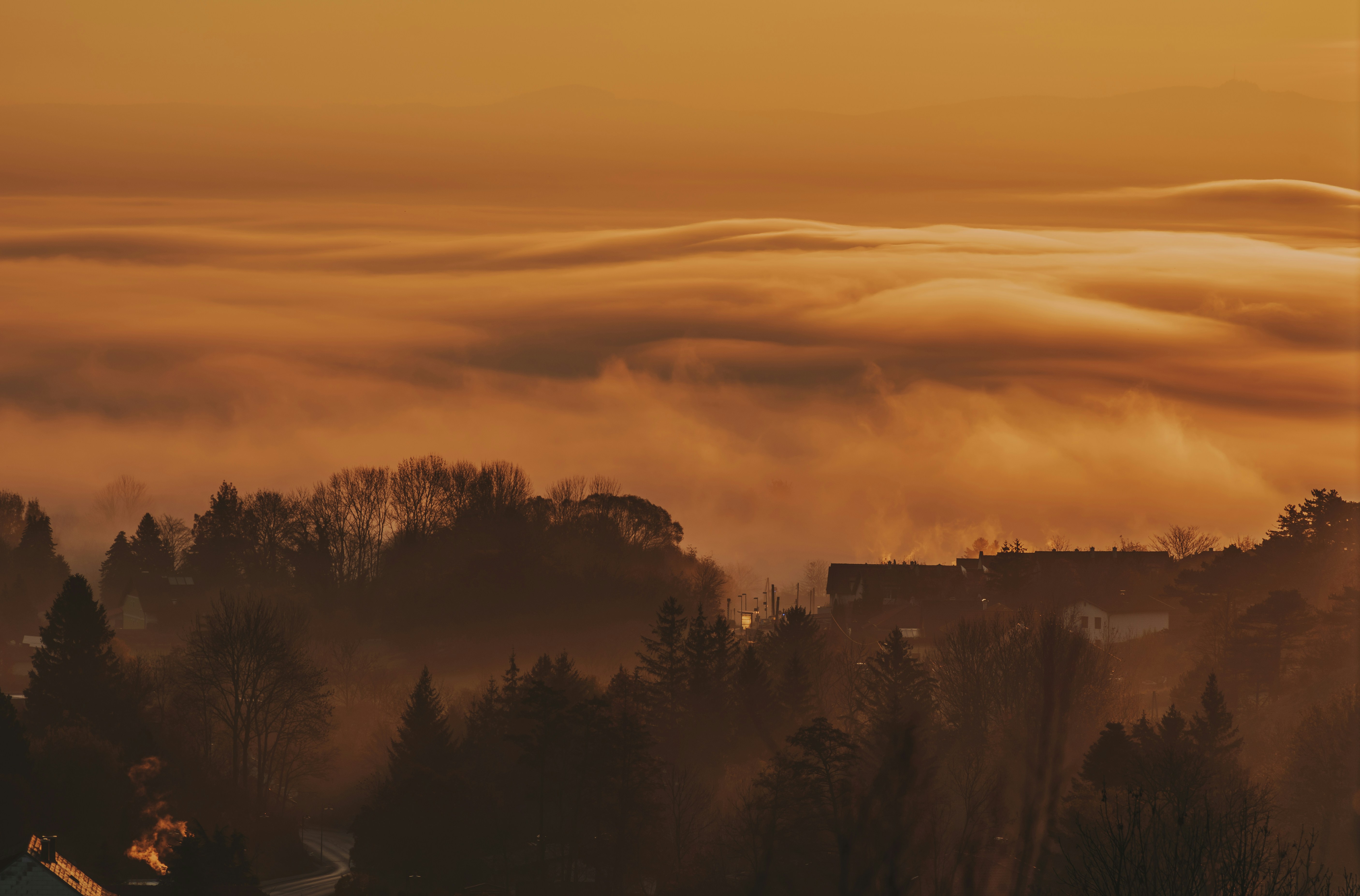 A view of a city covered in a layer of fog photo – Free Unterhöflein ...