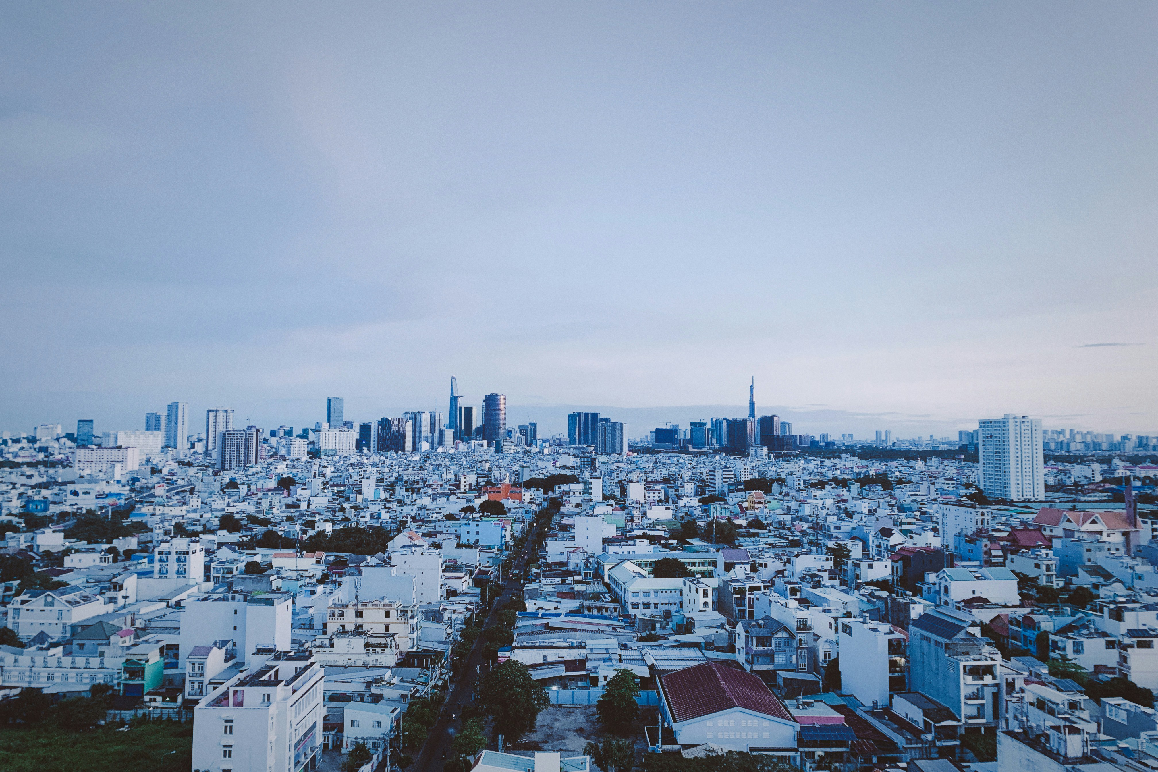 A view of a city from the top of a hill photo – Free City Image on Unsplash