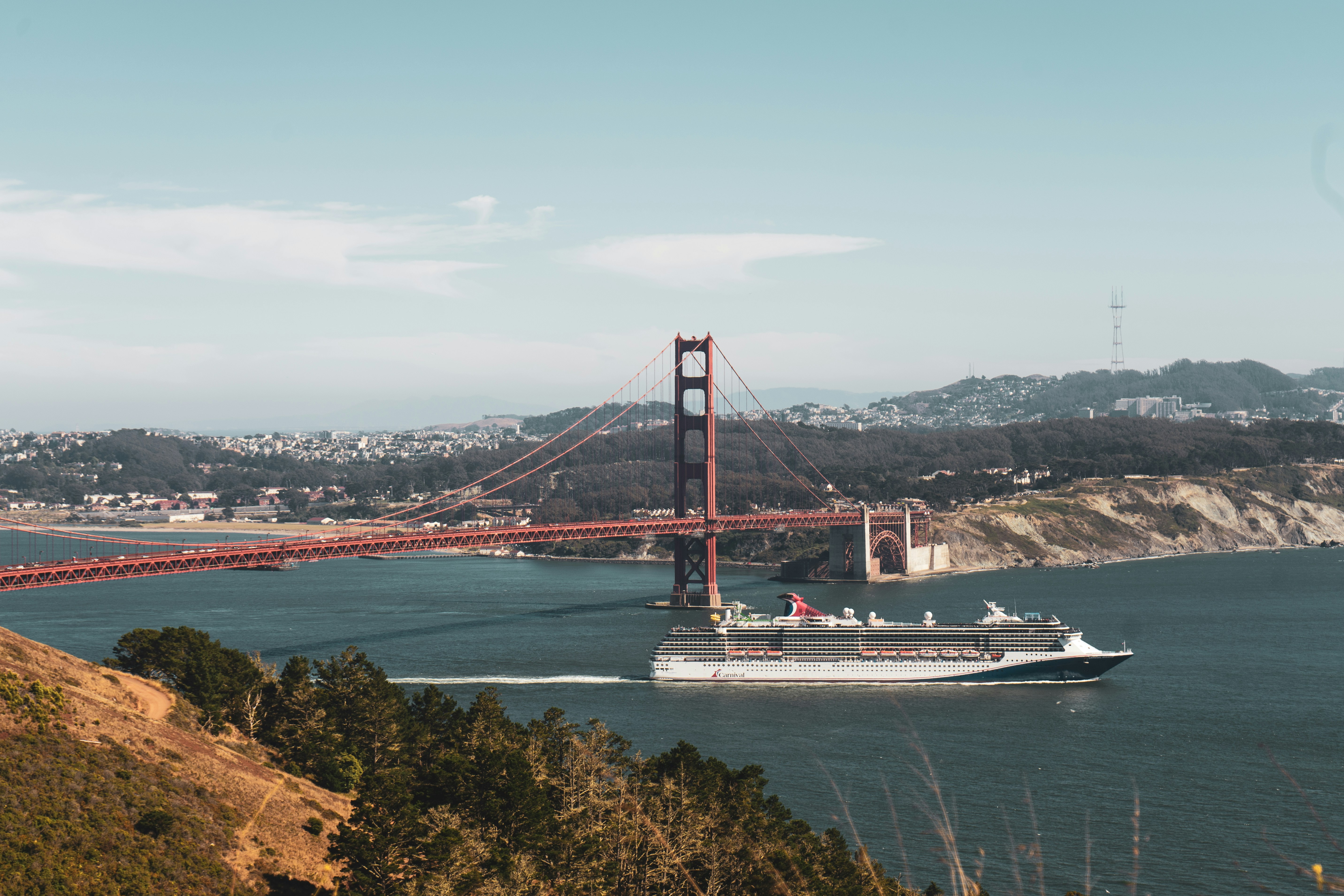 A cruise ship passing under the golden gate bridge photo – Free Boat ...