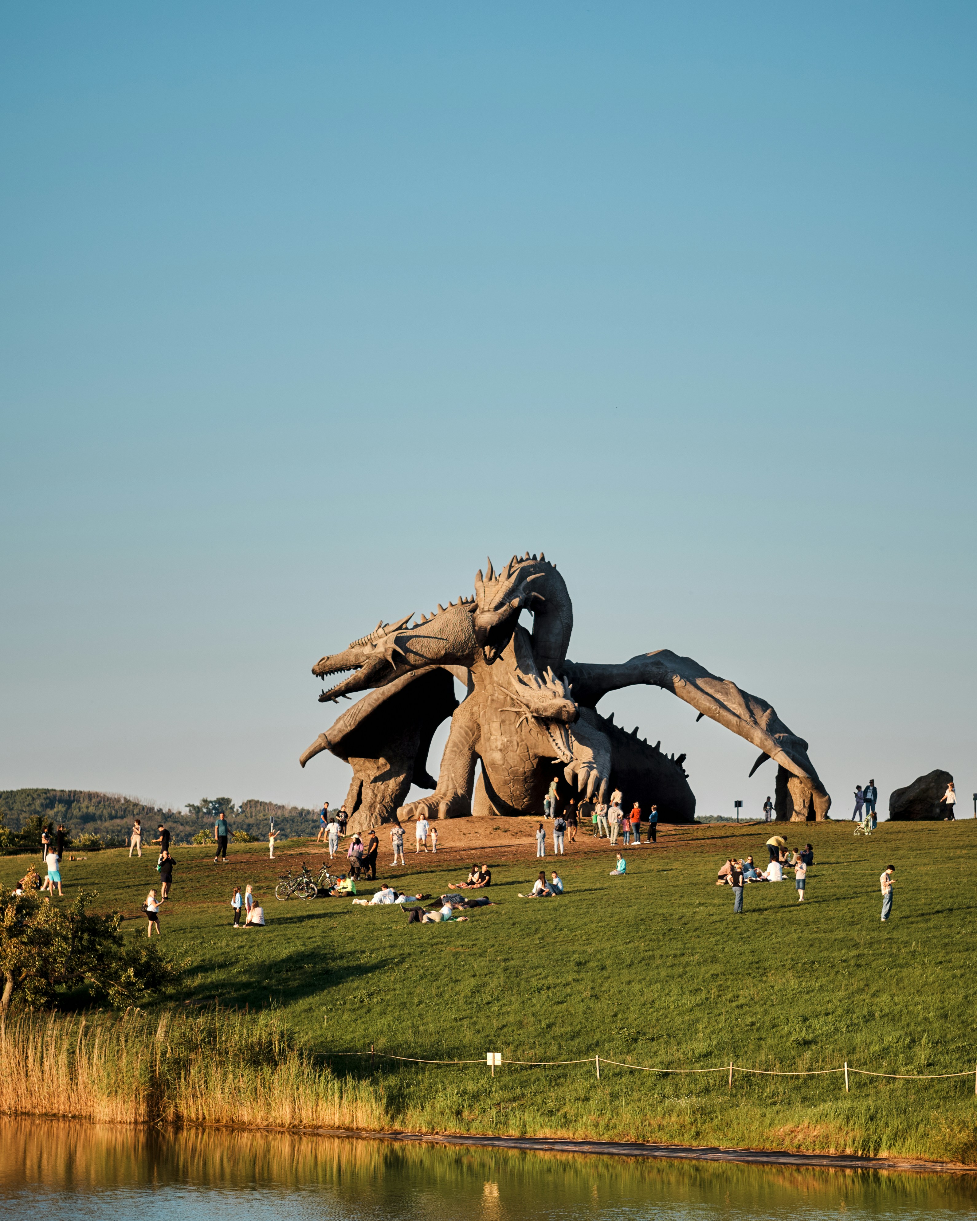 Dragon on the Hill: A sunlit monument drawing visitors to the grass