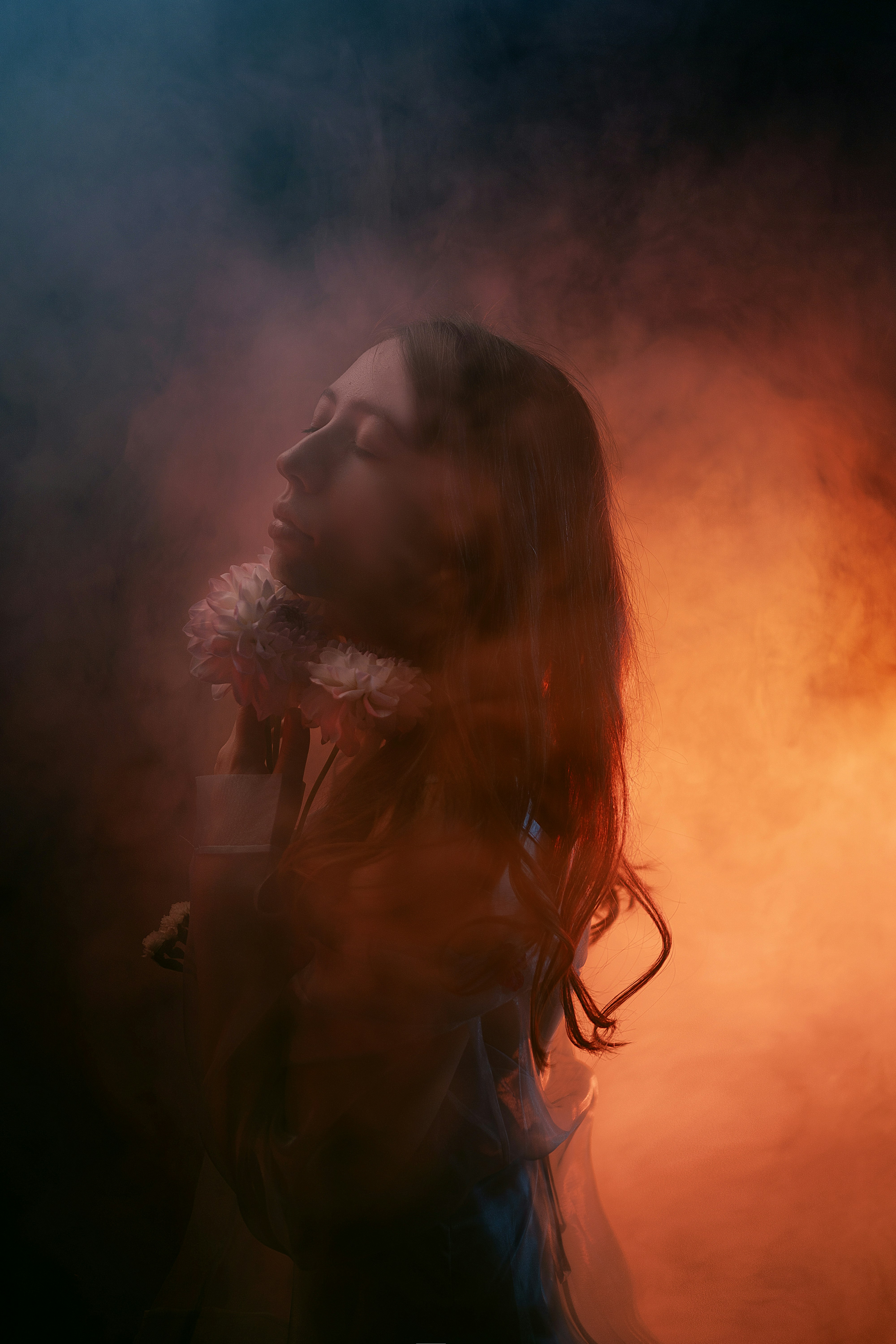 A woman with long hair standing in smoke photo – Free Photography Image ...