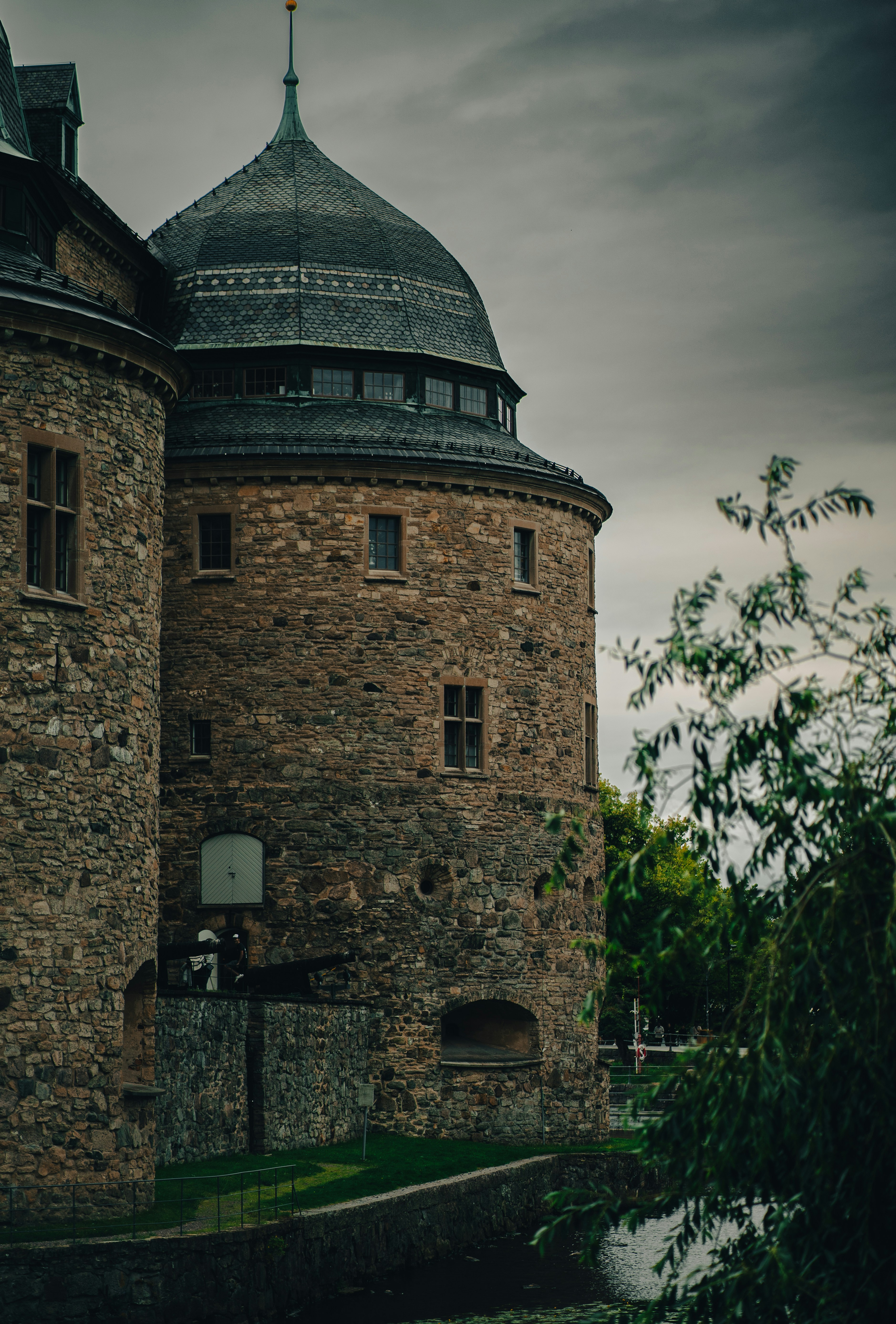 Whispering Round Tower: A Stone Sentinel by the Canal