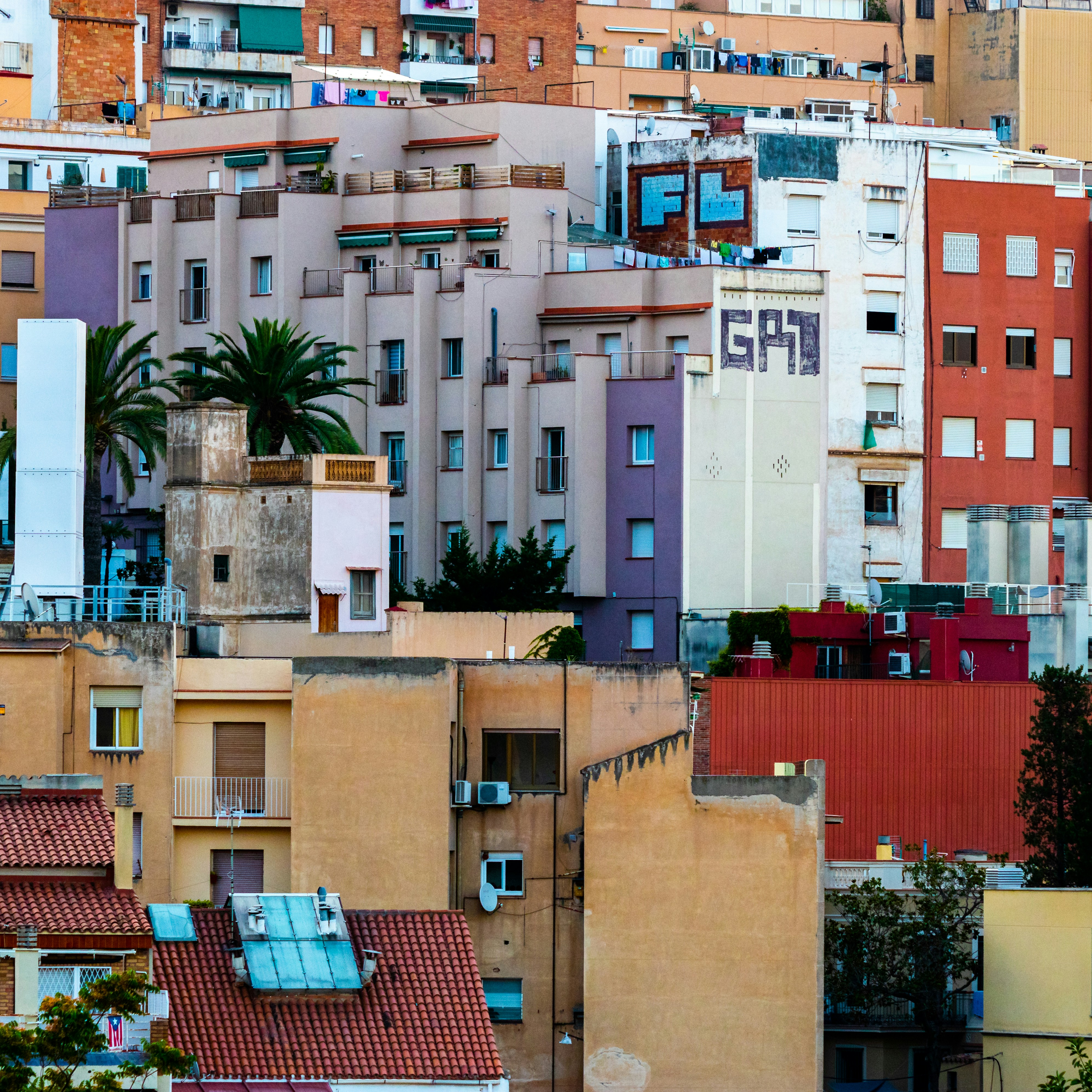 Patchwork Hill: A Prism of Balconies and Graffiti-Laced Facades