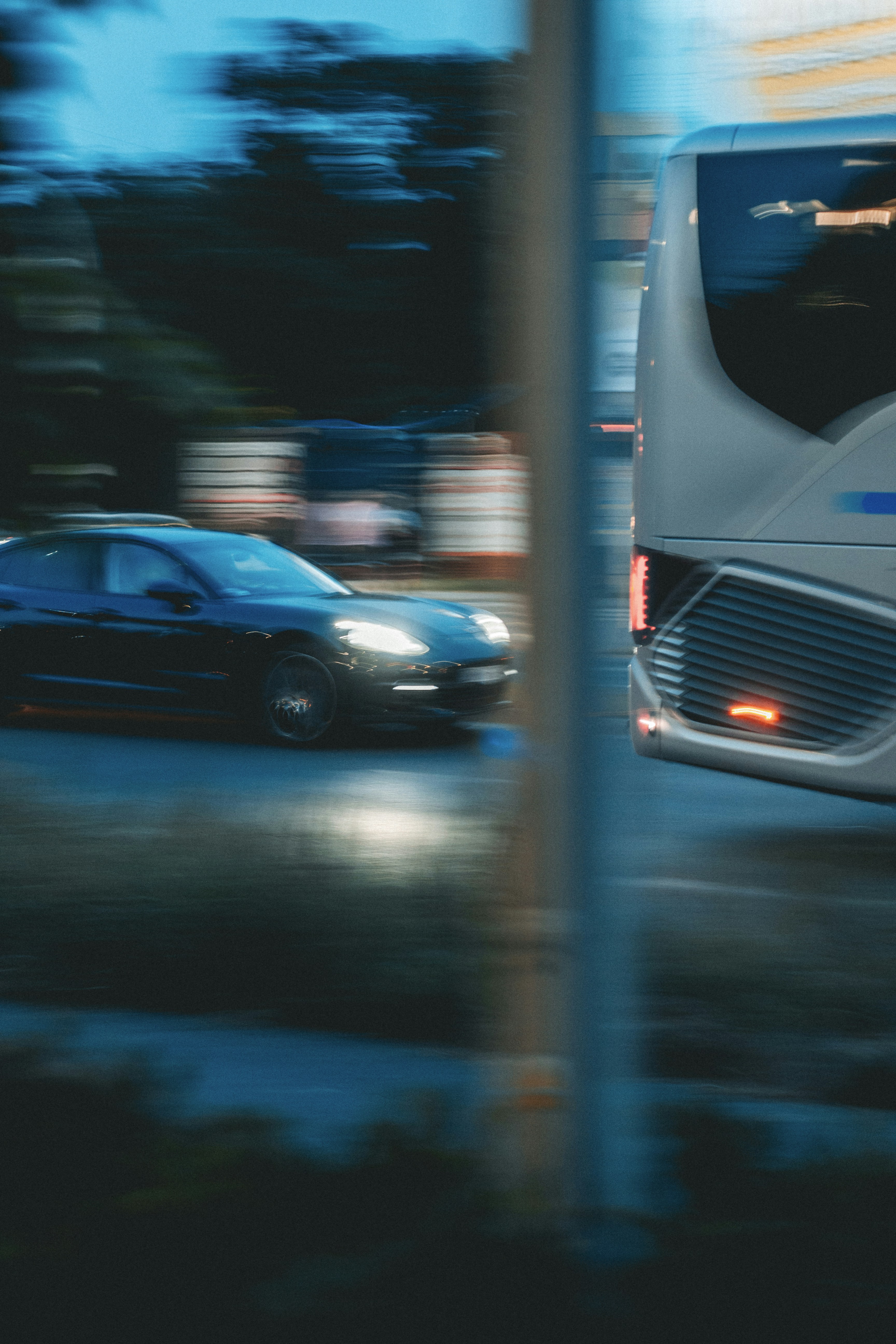 Blue Hour Blur: Headlights Through a Moving City