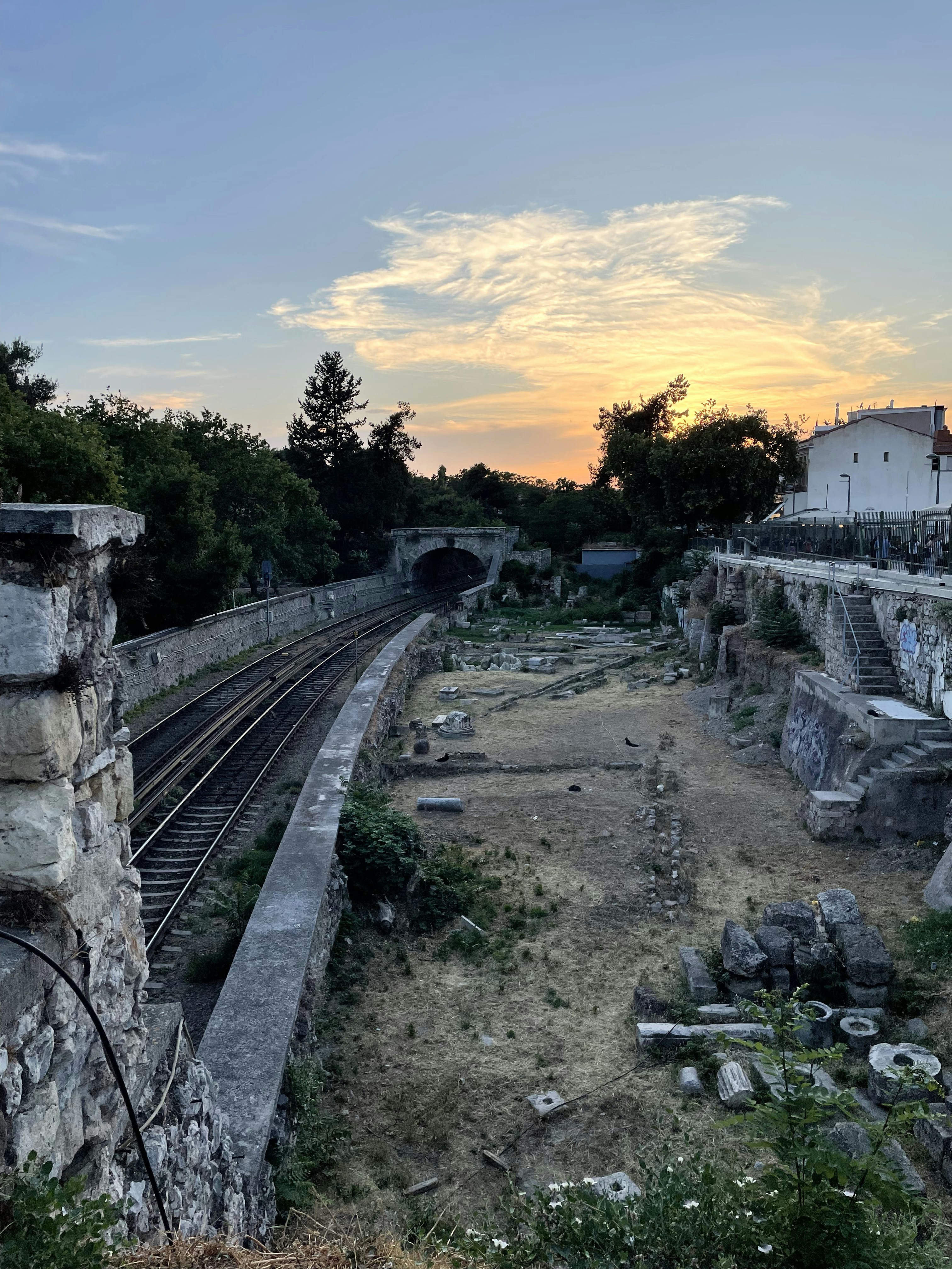 Dusk at the Converging Rails: A Tunnel's Quiet Remains