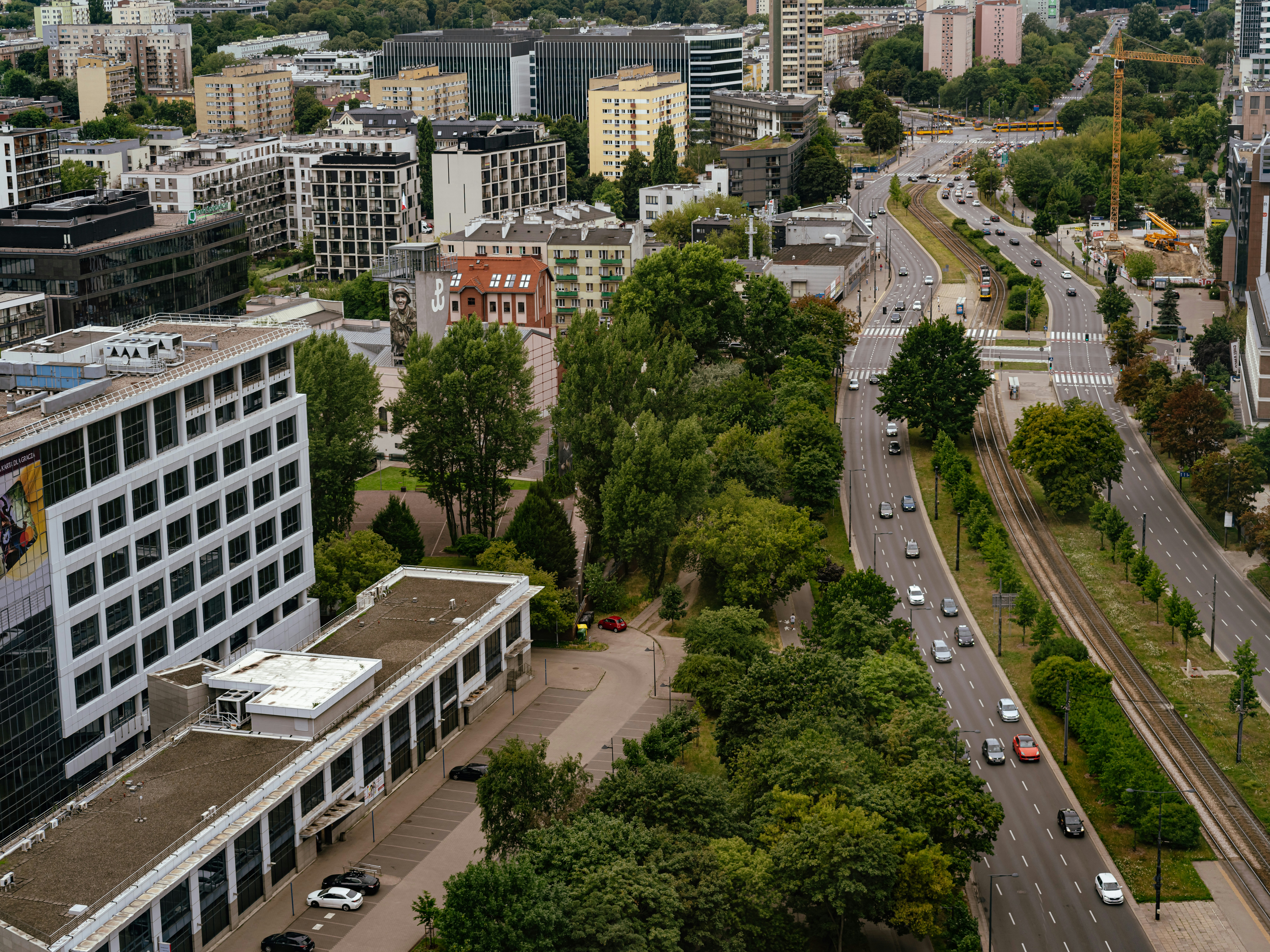 An aerial view of a city with tall buildings photo – Free Street Image ...