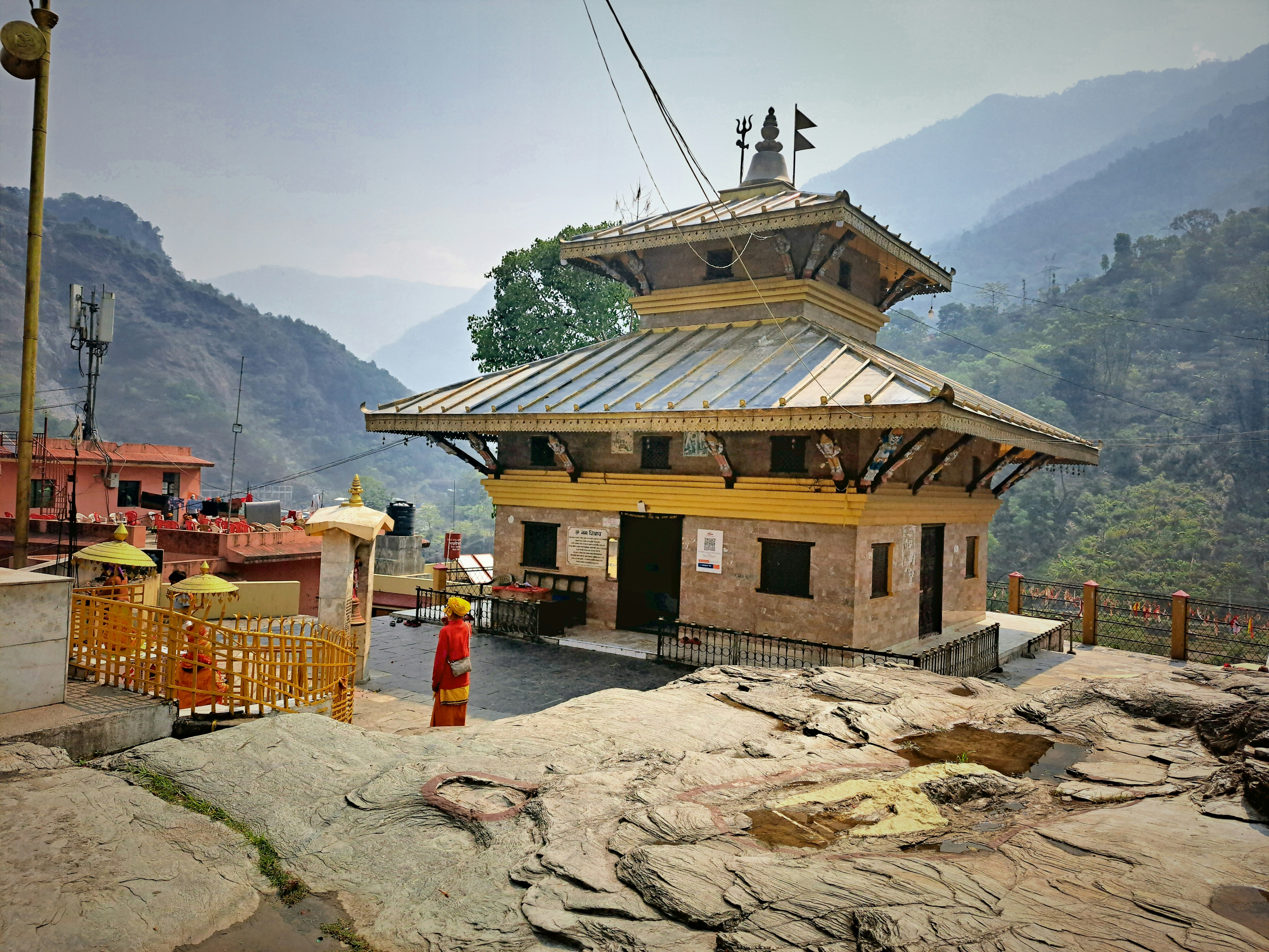 Golden Roof on a Himalayan Ridge: Temple Over Misty Valleys