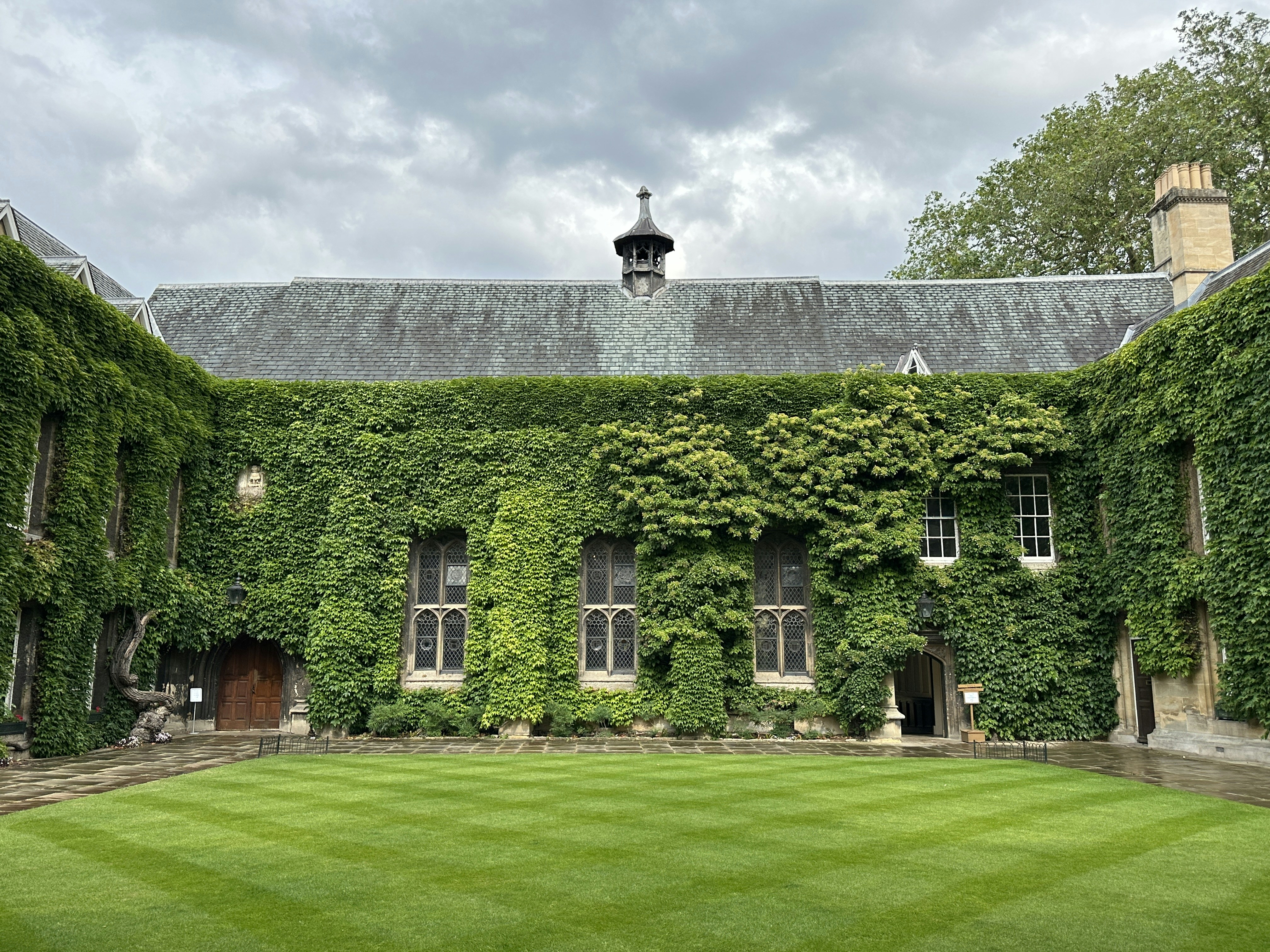 Ivy Cathedral Courtyard: Symmetry Under a Slate Crown