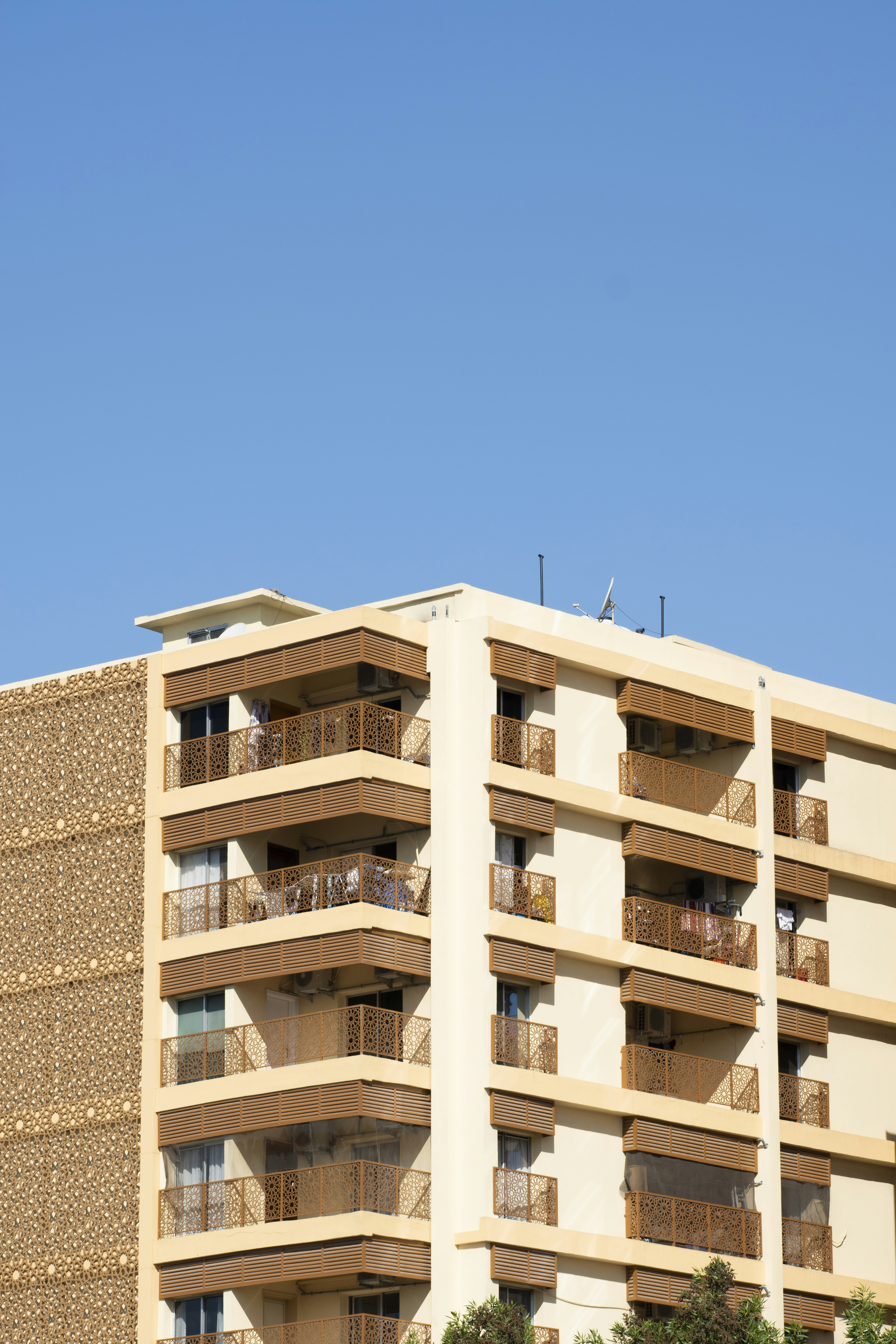An apartment building with balconies and balconies on the balconies ...