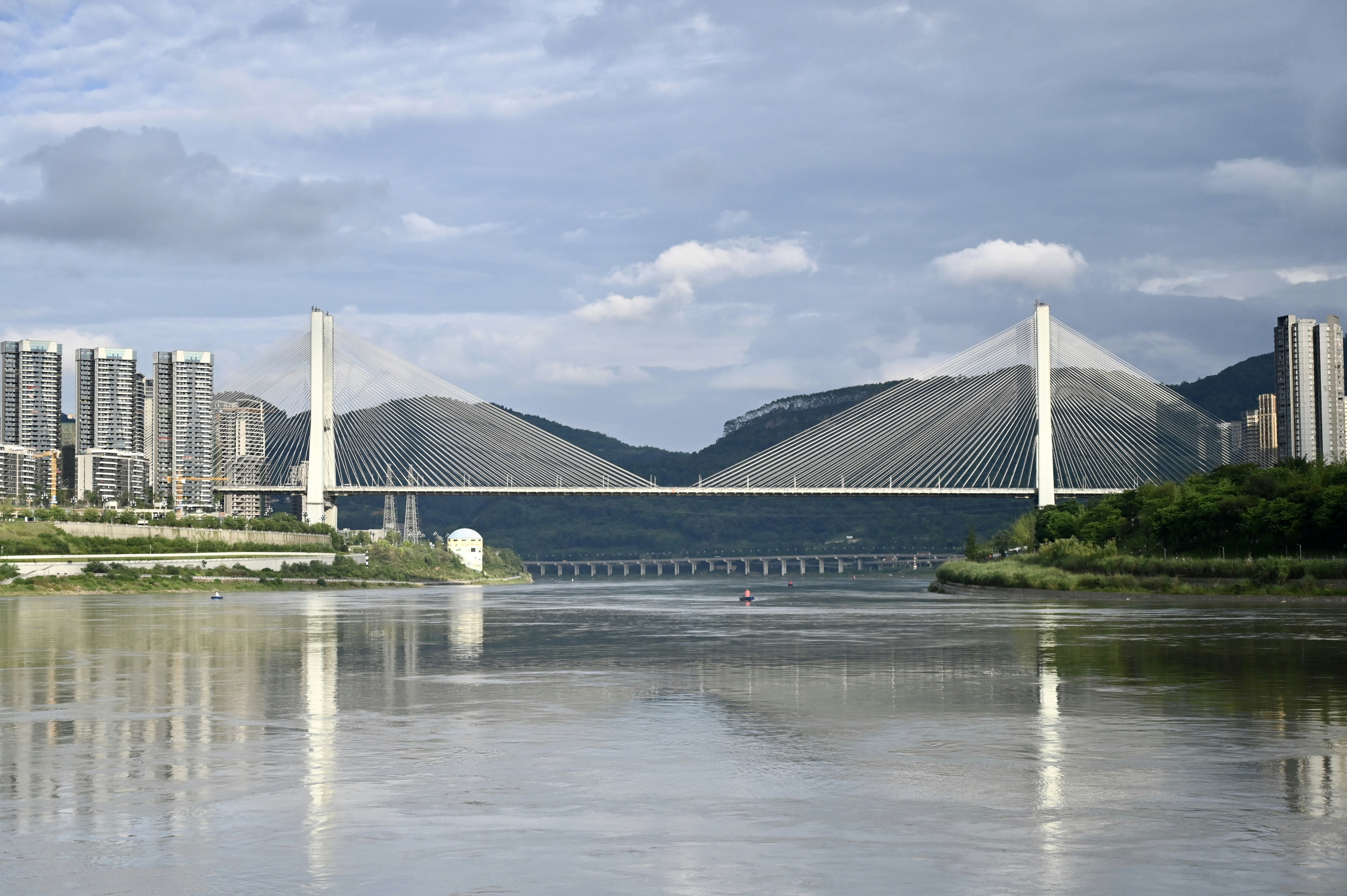 Cable-Suspended Horizon: Bridge Spanning a Reflective River