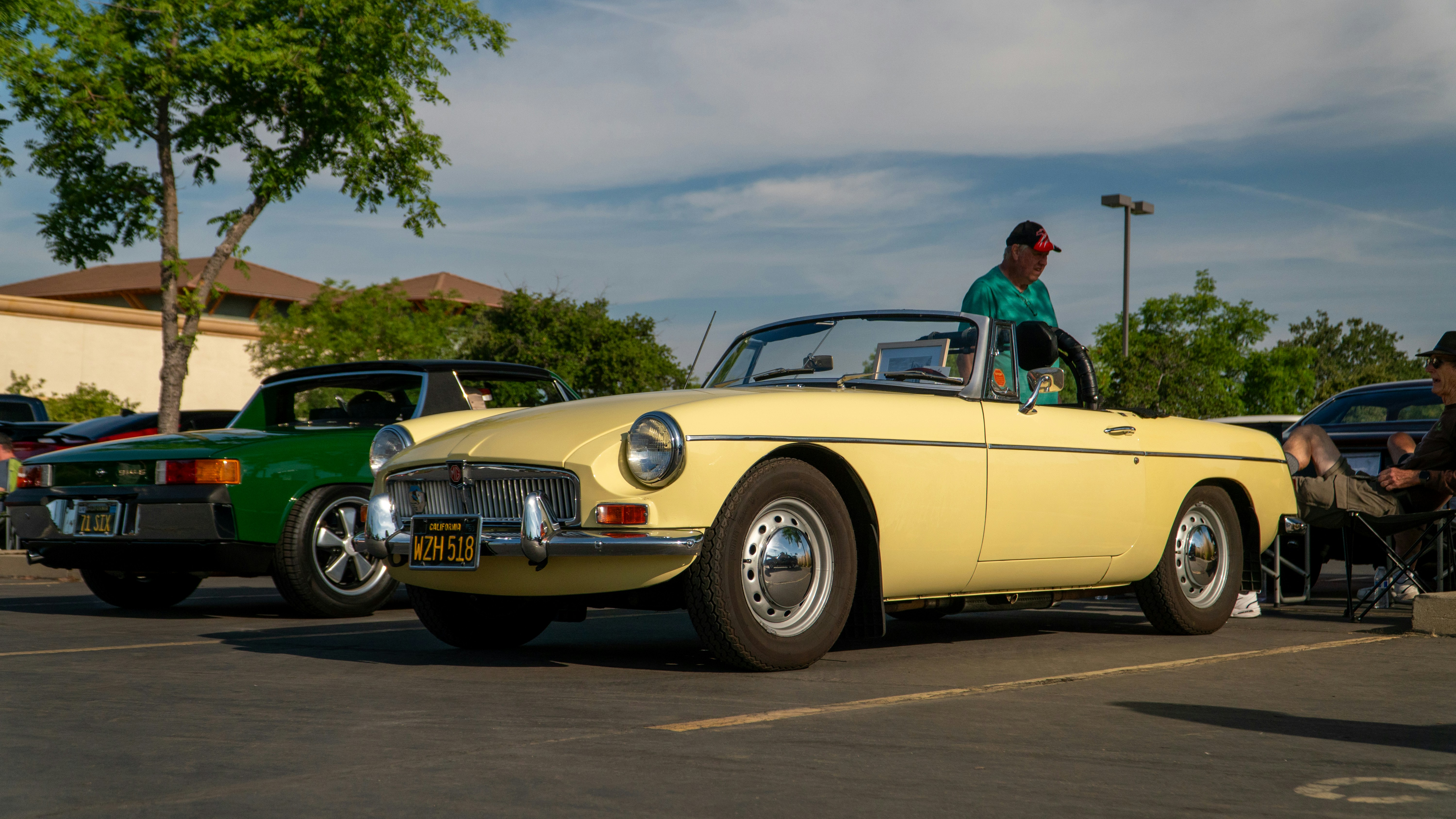 Cream Convertible Spotlight: A Classic Car at a Sunlit Show