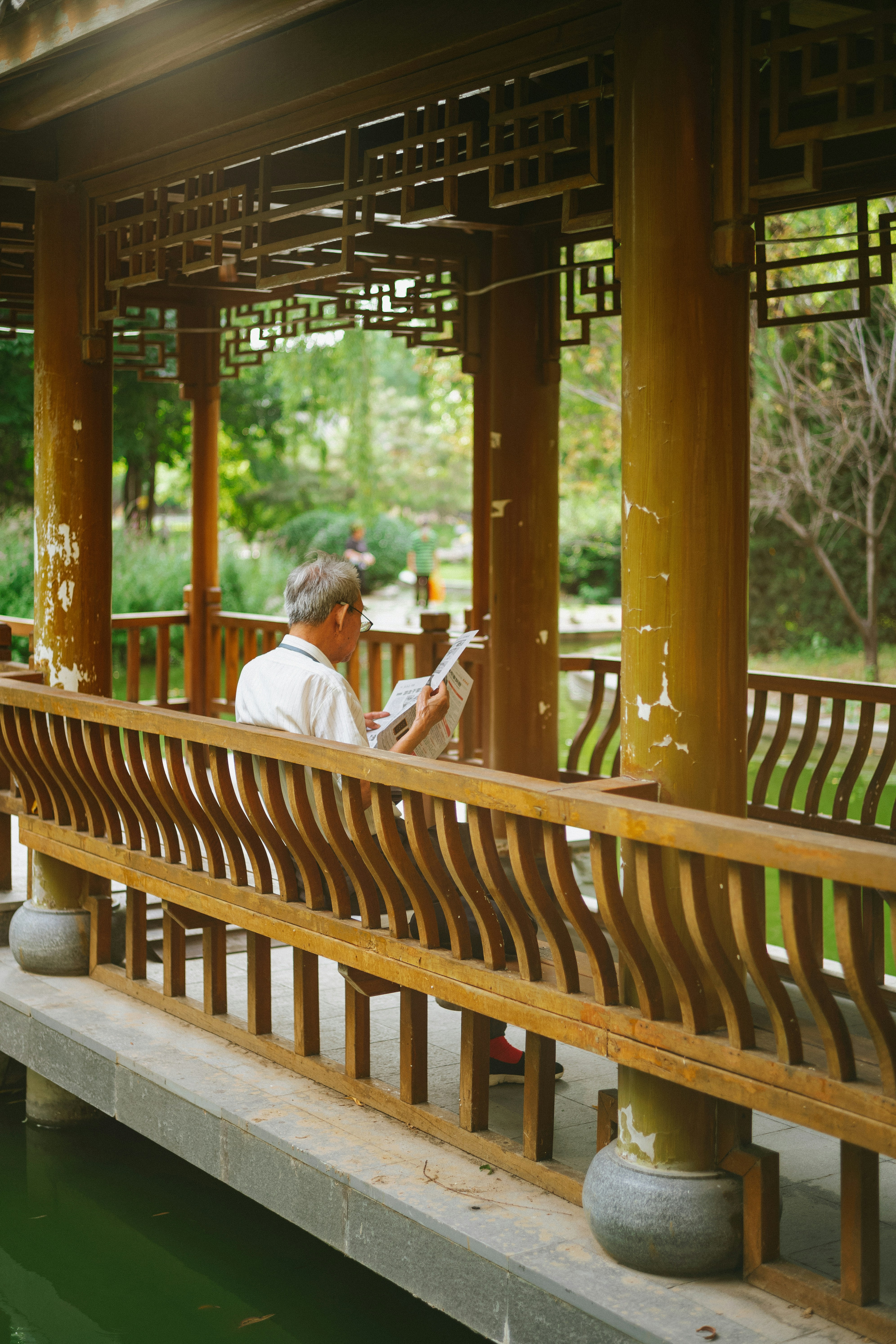 Pages by the Pond: A Reader in the Timber Pavilion