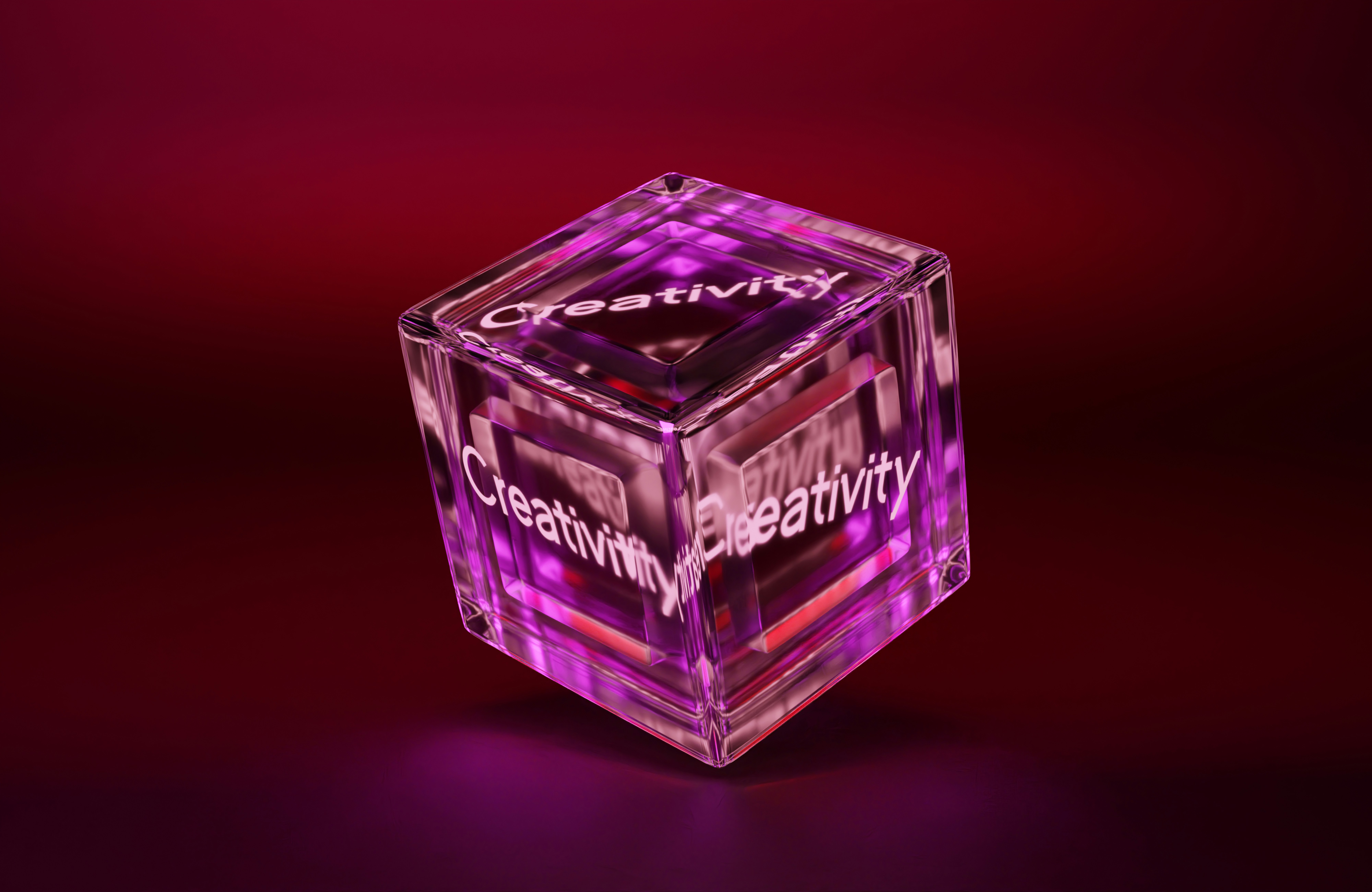 A purple cube with the words creativity written on it photo – Free ...
