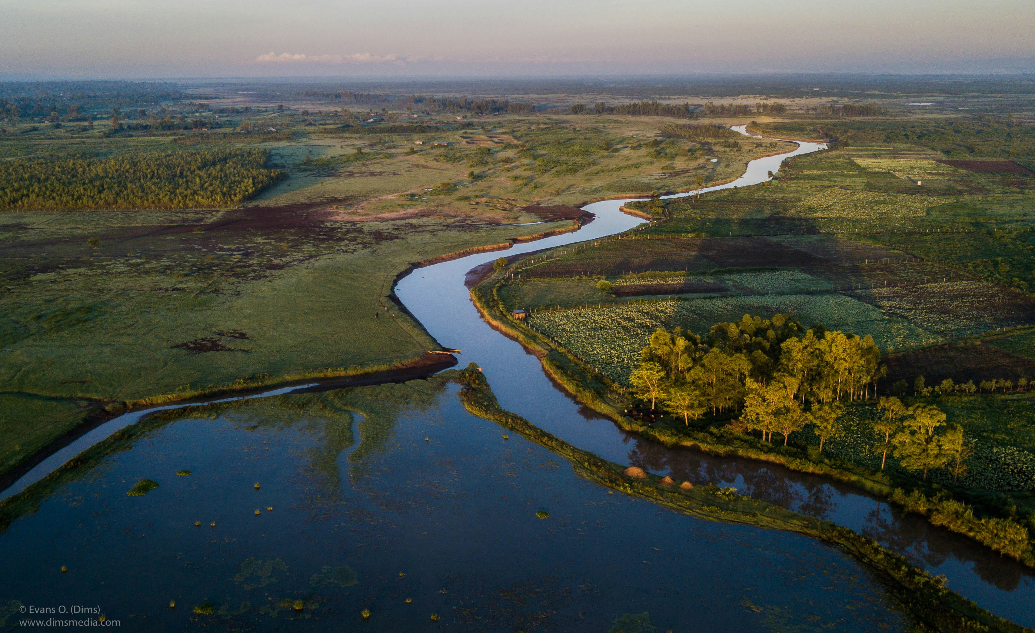 A river running through a lush green countryside photo – Free Nyando ...